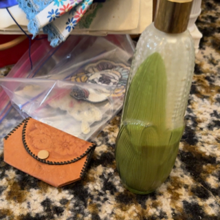 Corn dispenser and leather coin purse