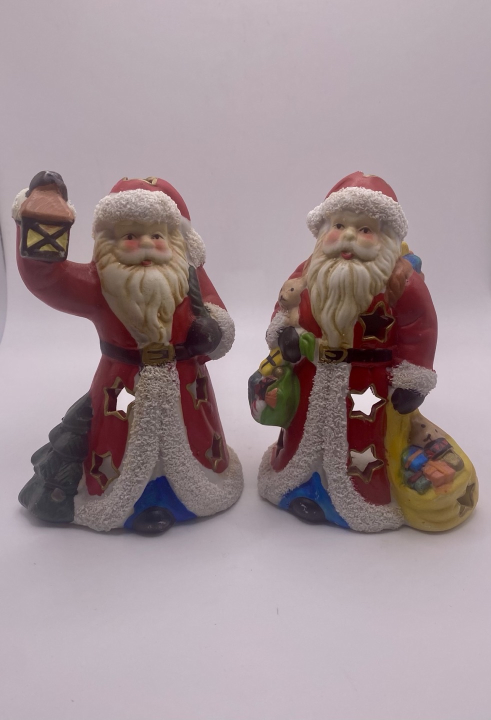 650. Set Of 2 Vintage Ceramic Santa Tea Light Holders