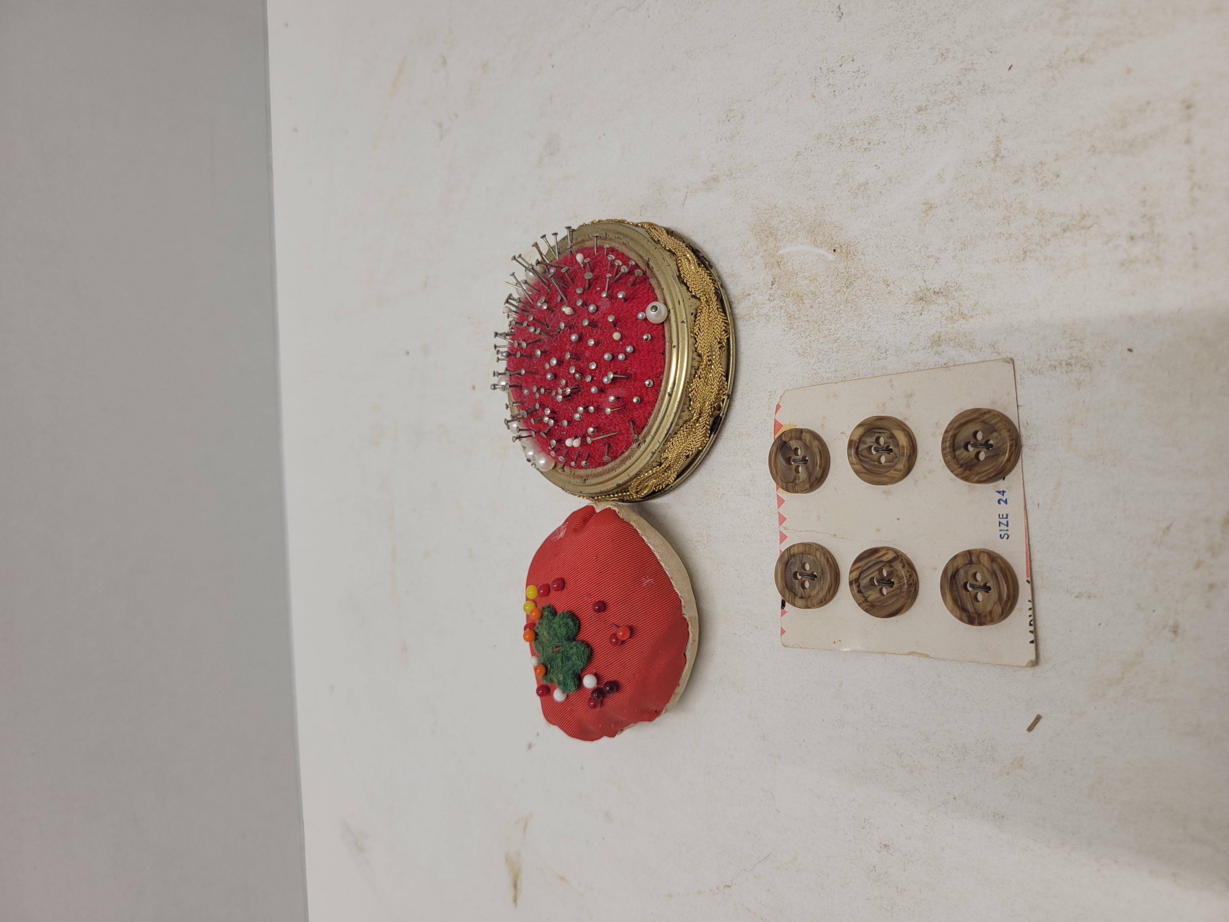 Pin cushion and button