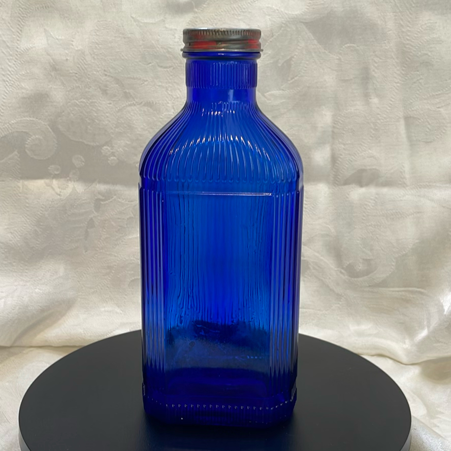 Vintage cobalt blue medicine bottle 8 inches