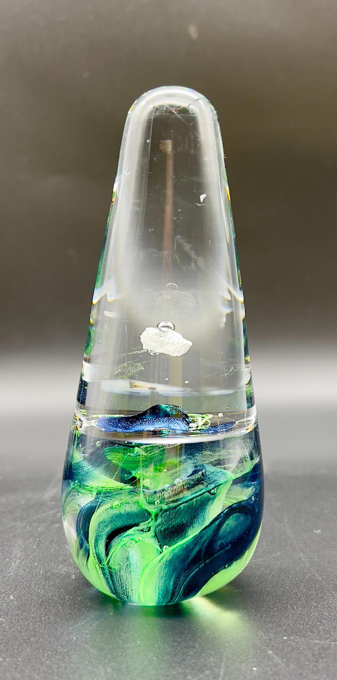 Vintage hand-blown narrow conical art glass paperweight with emerald ...