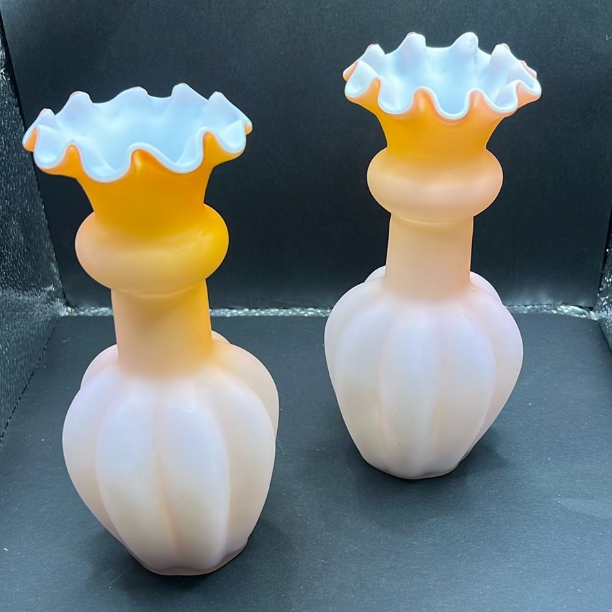 Set Of 2- Antique Victorian peach satin glass vases with ruffled rims.