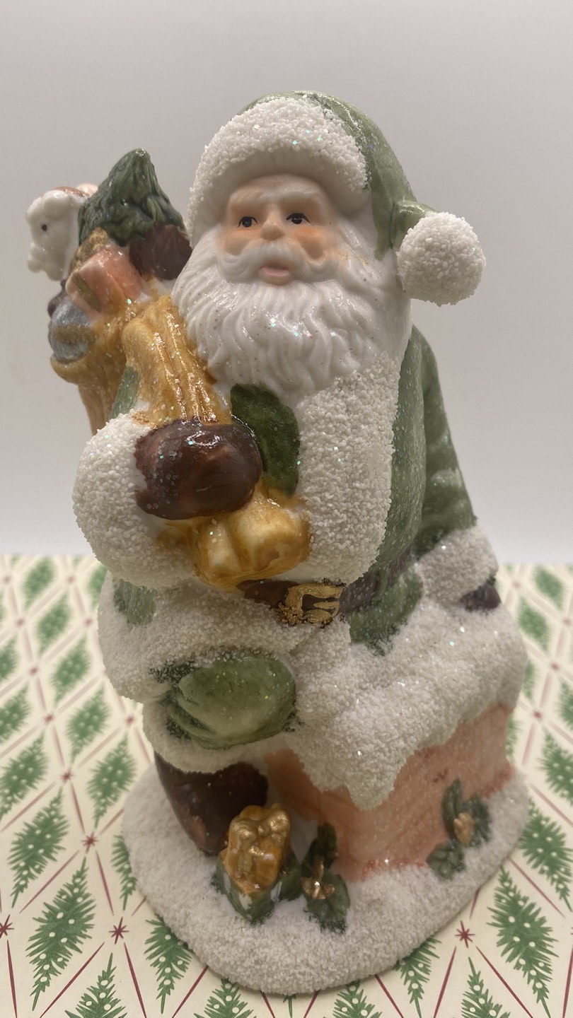503. Glitter Santa Clause With Chimney & Bag Of Toys 6 inches tall.