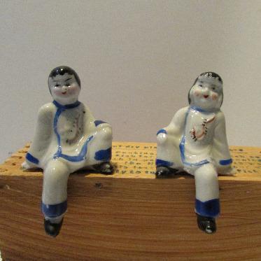vintage girl and boy sitting figurines made in Occupied Japan shelf ...