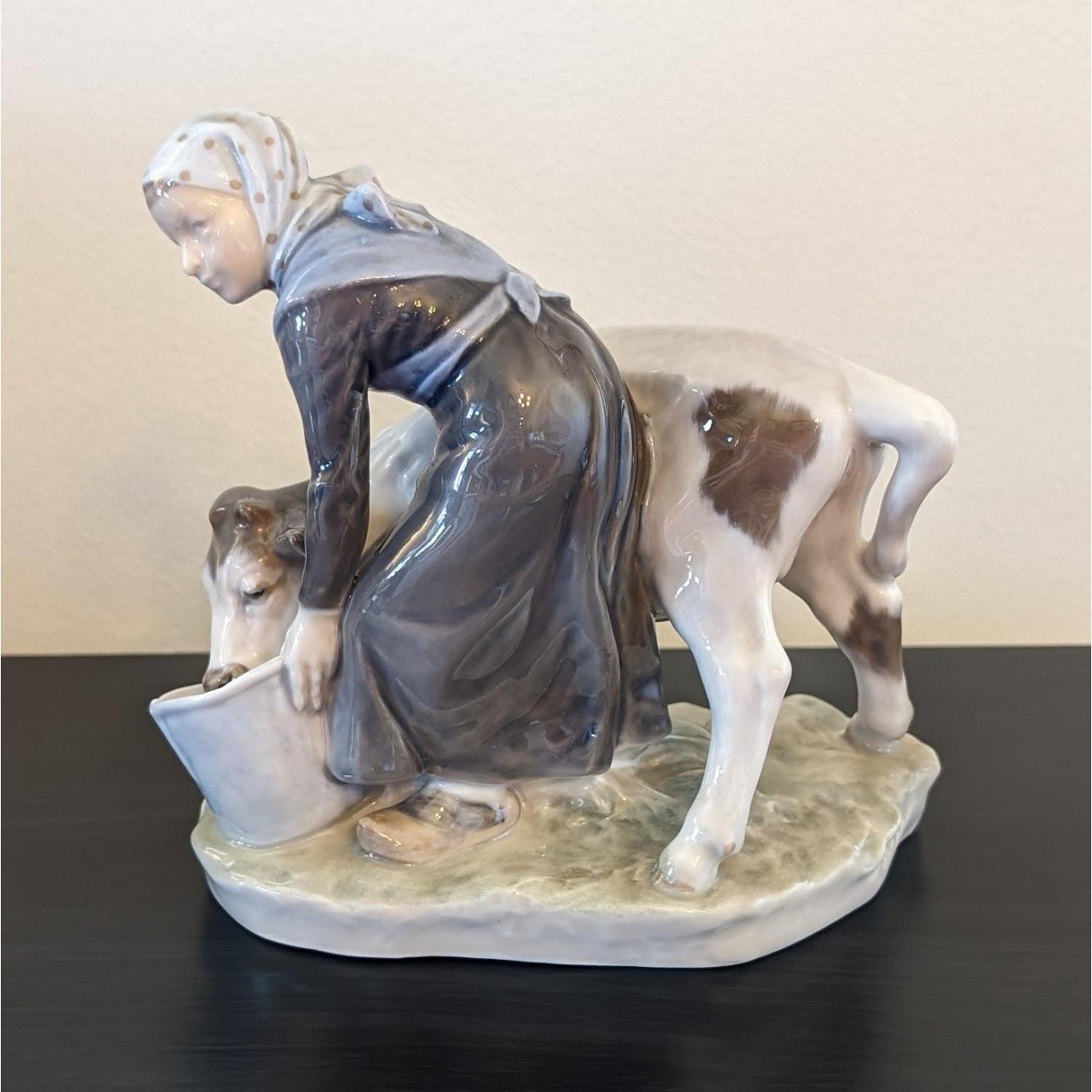 Vintage Royal Copenhagen Girl Feeding Calf Figurine #779