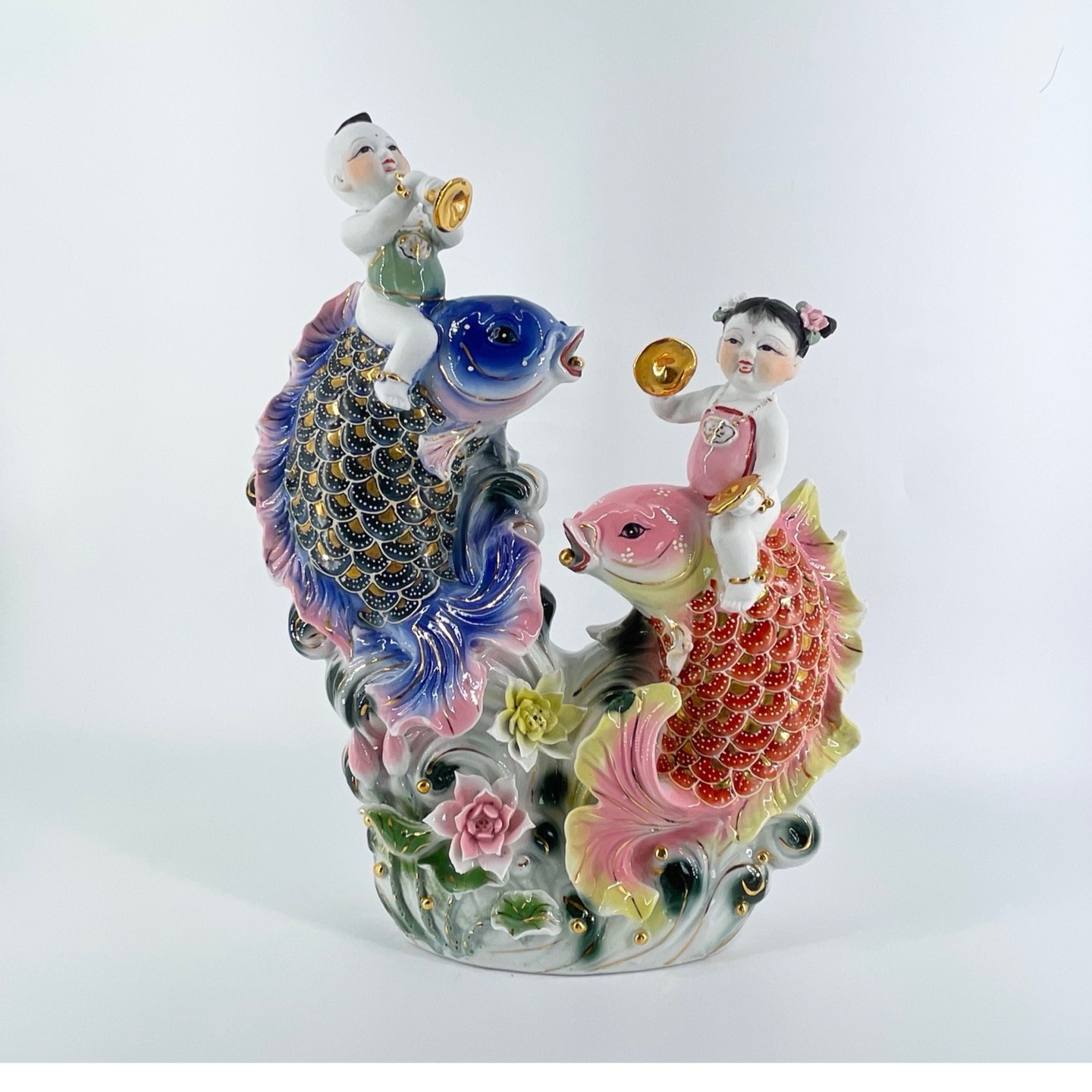 Chinese Figurine Of Children Riding Koi Fish