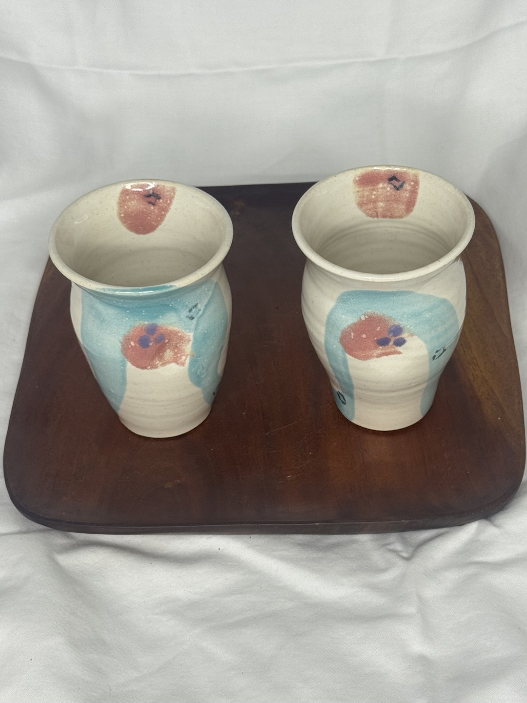 Two Handleless Ceramic Hand Painted Tea Mugs