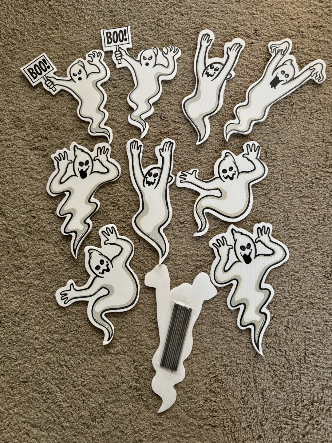 Halloween 10 ghosts about 7” tall with 10 sticks.
