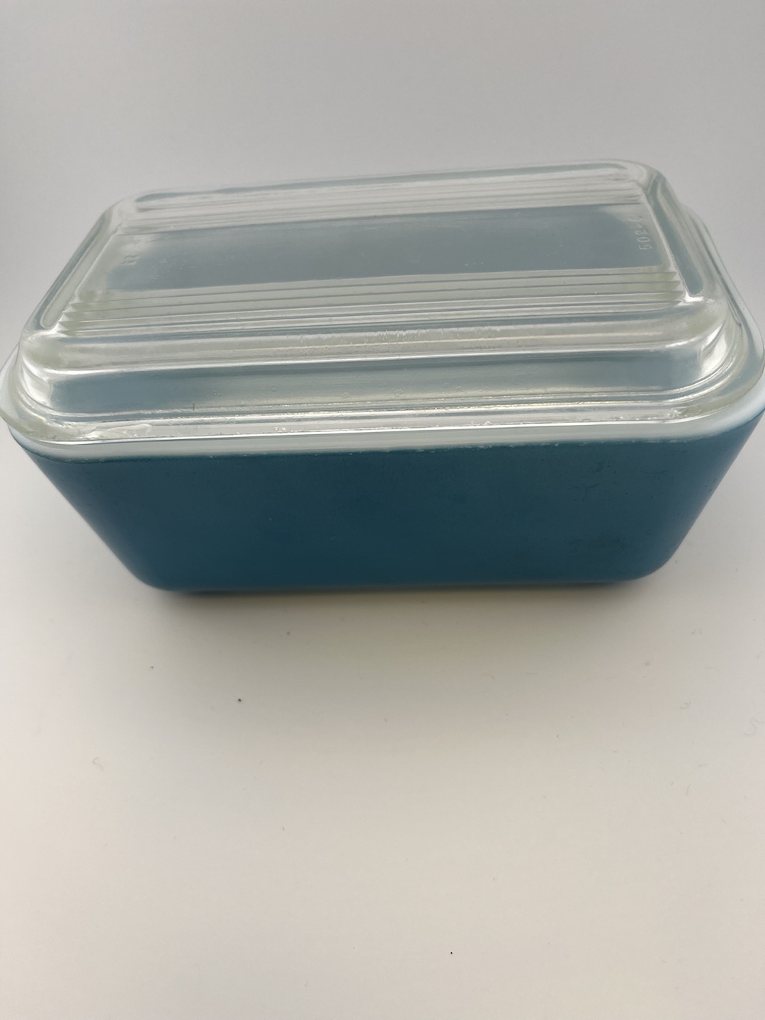 PYREX marked all in Caps. Refrig dish w/ lid. Blue, with clear ribbed lid