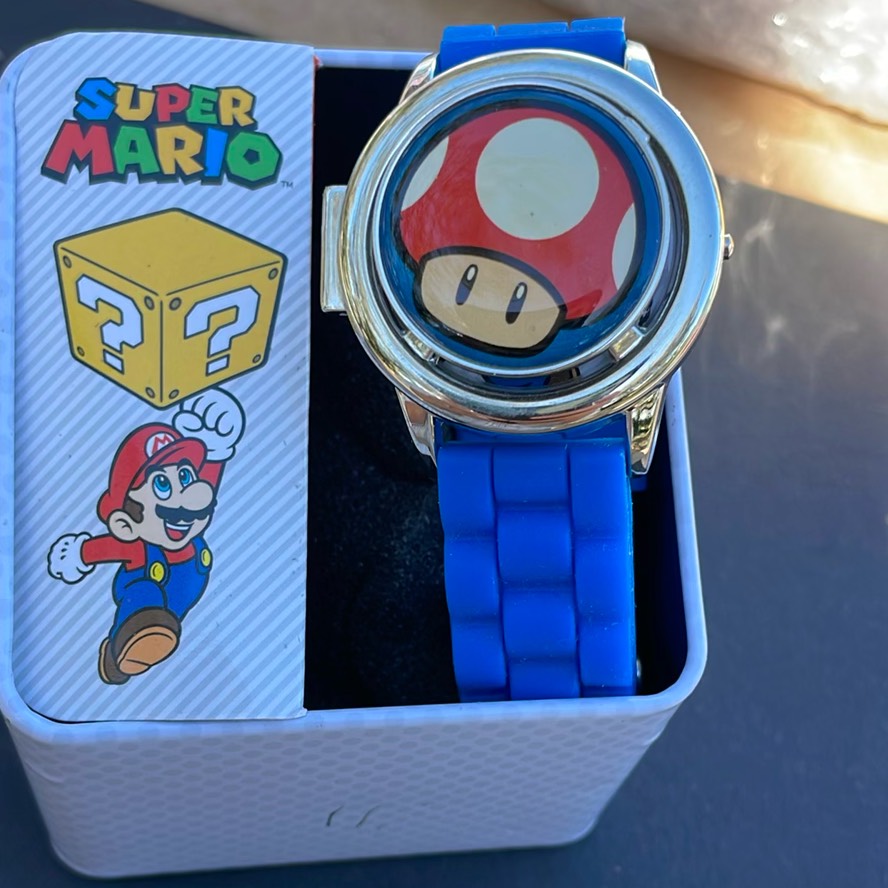 Super Mario Bros Spinning Toad Face Mario LCD Watch Blue Band + Tin