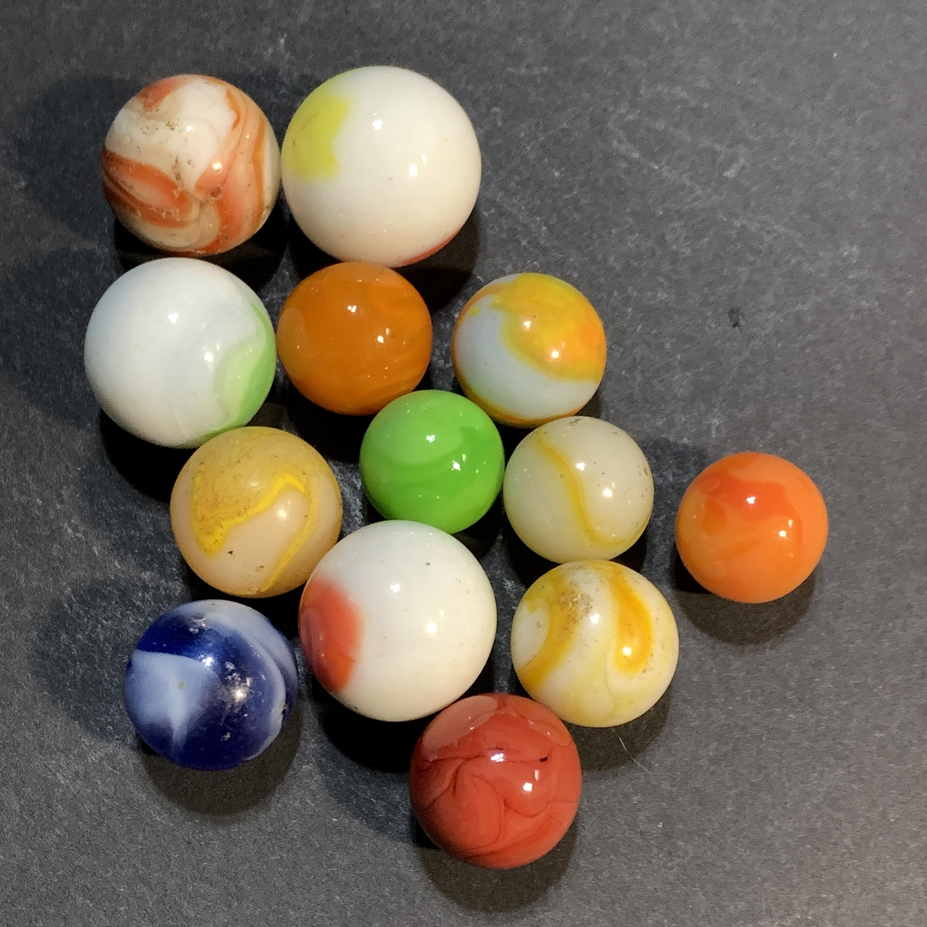 13 Assorted Glass Marbles Glow