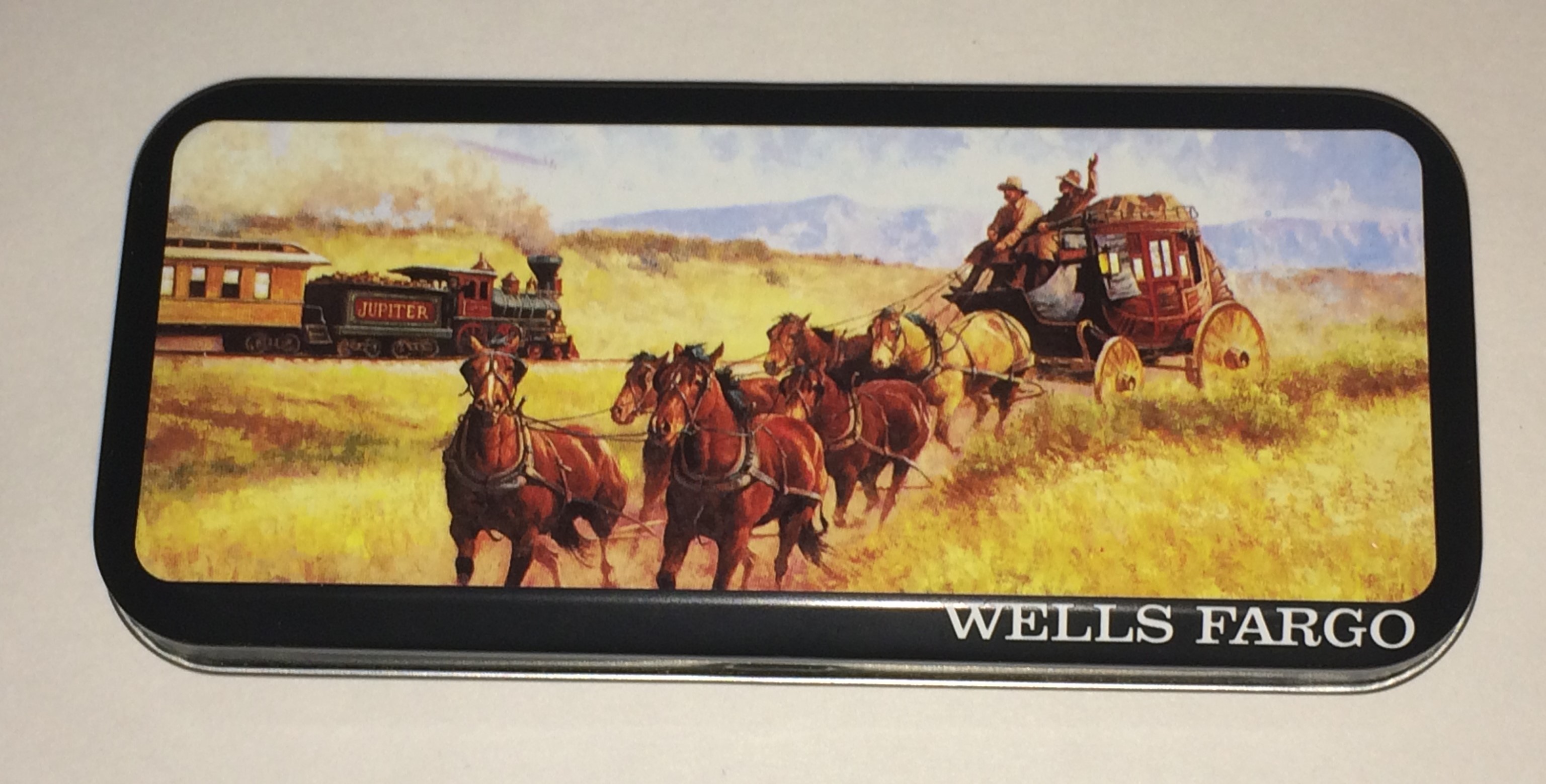 Wells Fargo Tin 5 1/2" long x 2 1/2" wide x 3/4" deep. Horse, Train ...