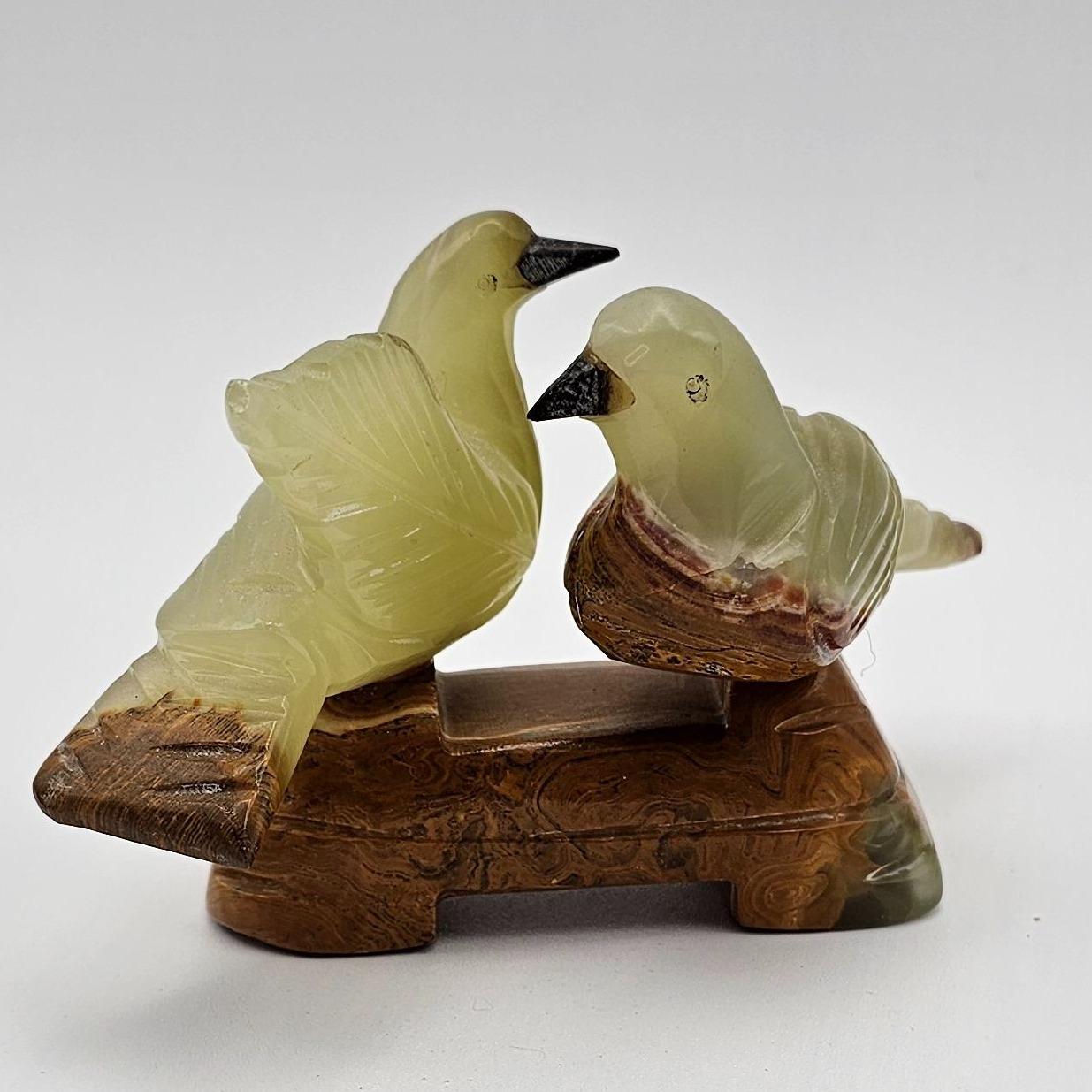 42. Hand Carved Stone Birds - Item