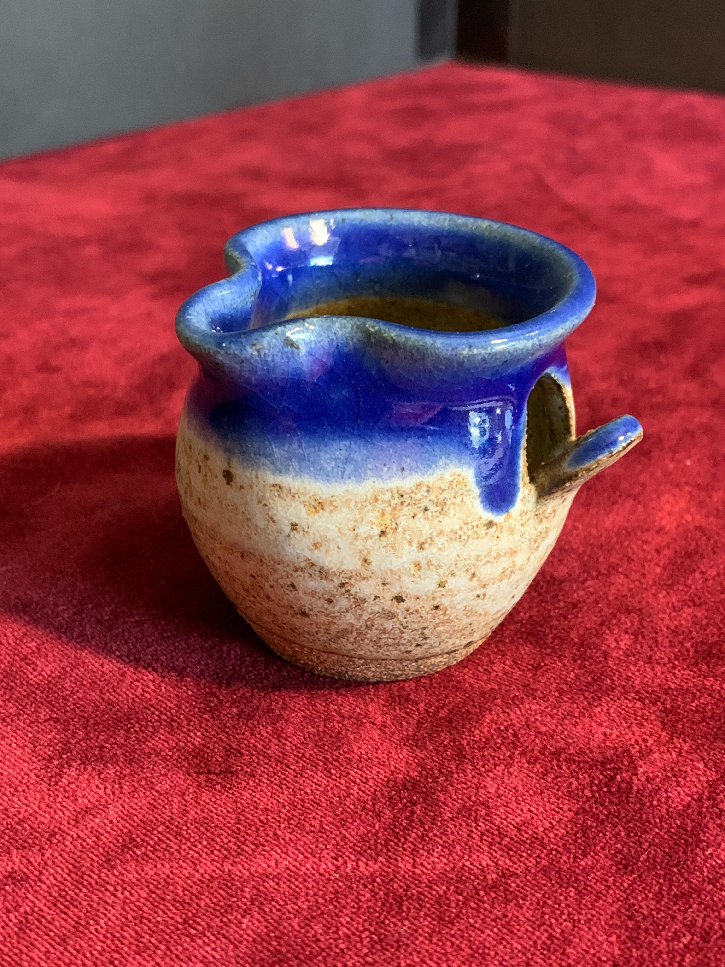 B6. G. Houston Pottery Egg Separator