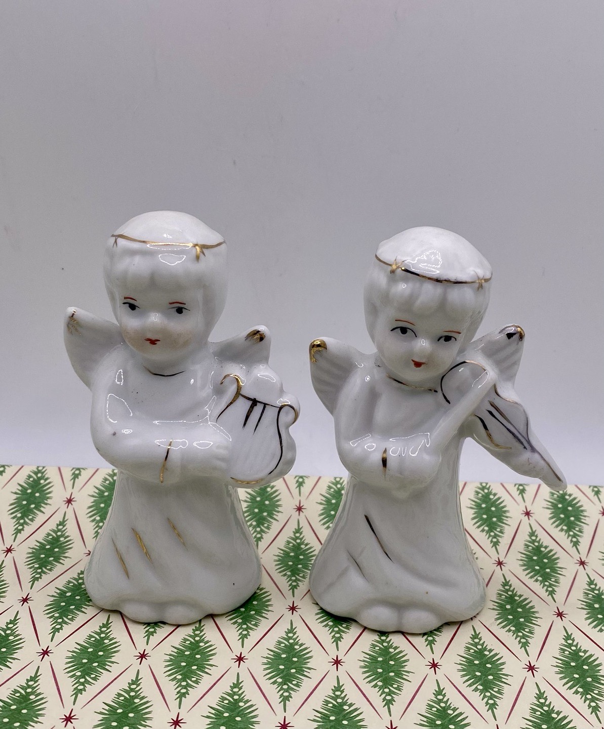 498. Two Vintage Porcelain Angel Figurines Playing Musical Instruments