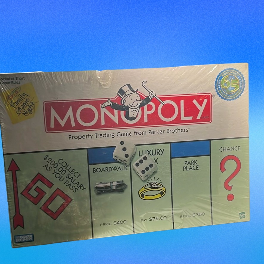 18. Monopoly 65th anniversary edition complete New sealed in package