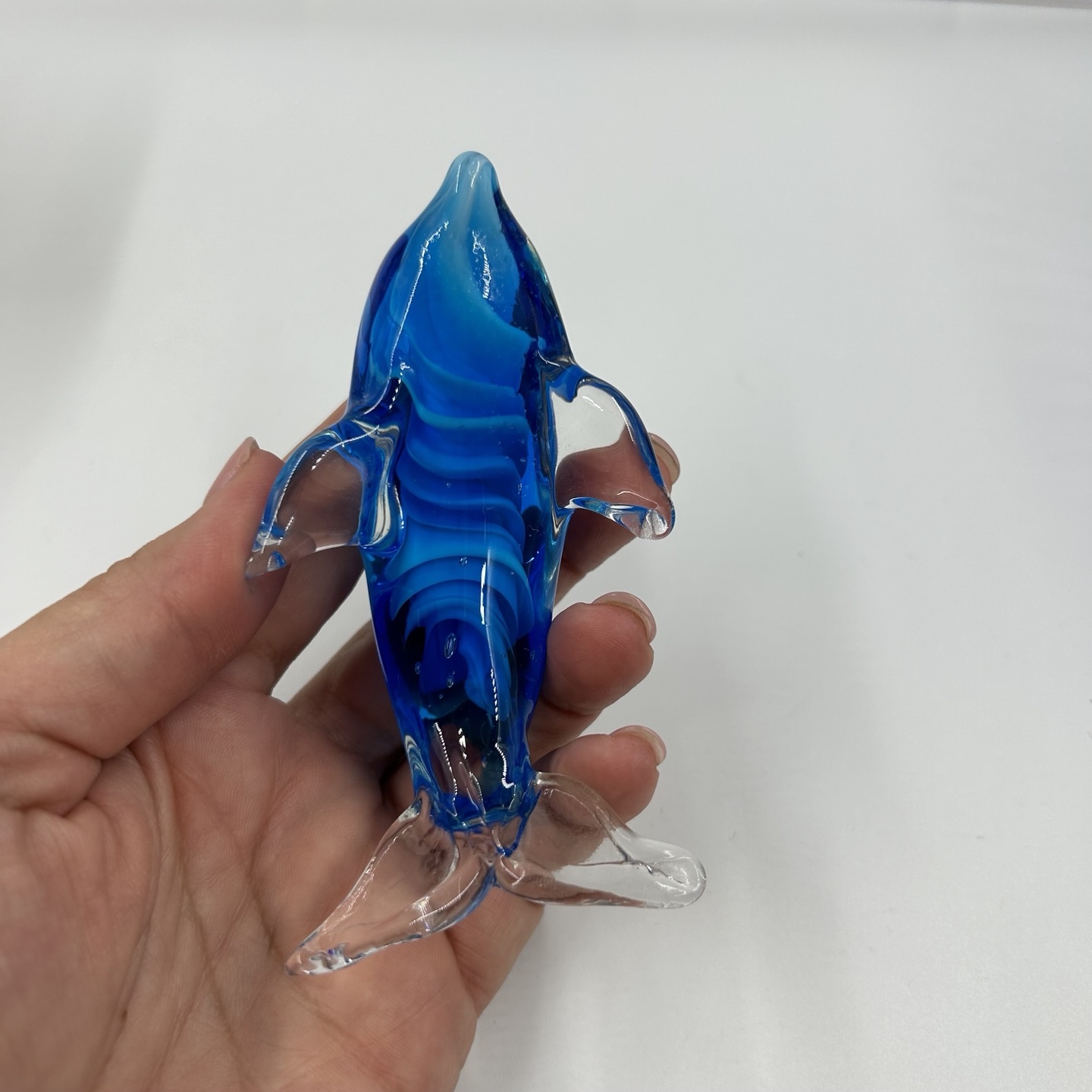 Small Art Glass Dolphin Paperweight With A Blue And White Swirl