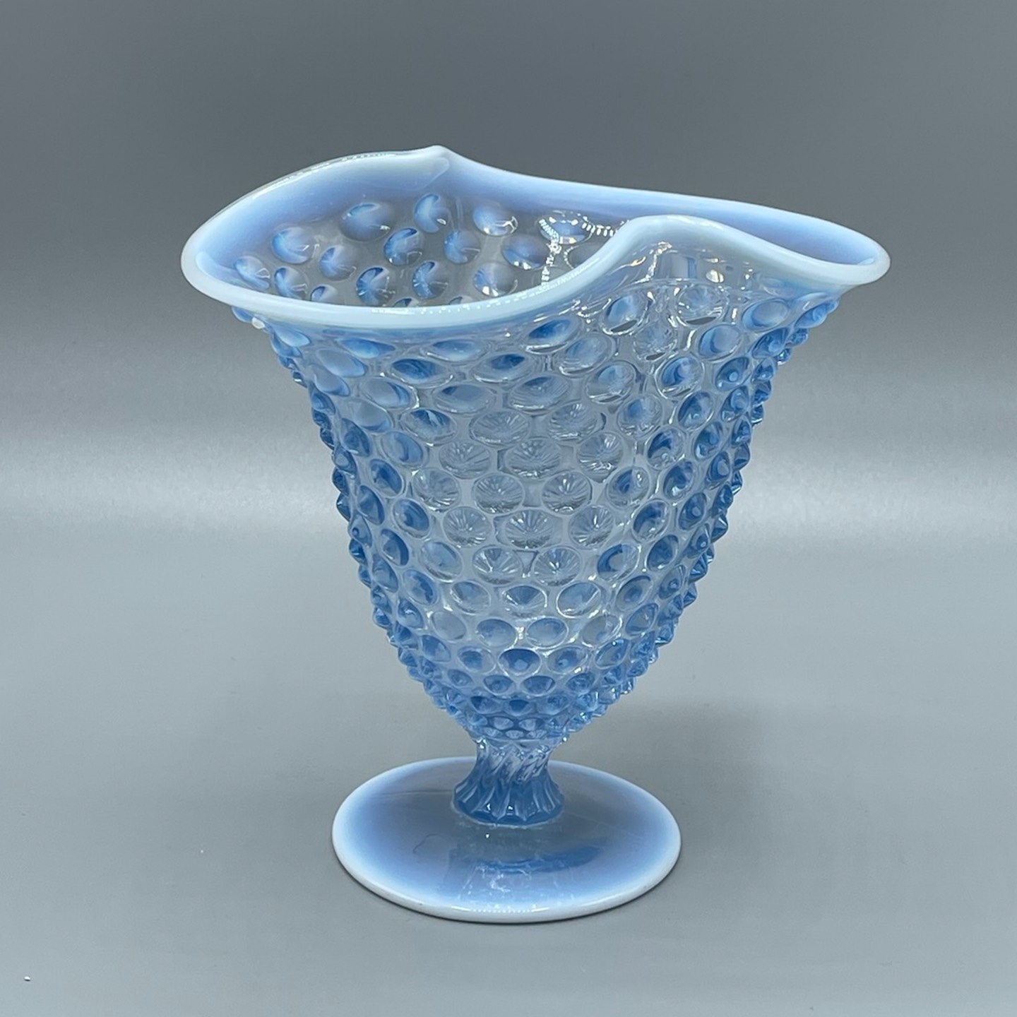 Duncan Miller Glass Blue Opalescent Hobnail Pinched Pedestal Vase