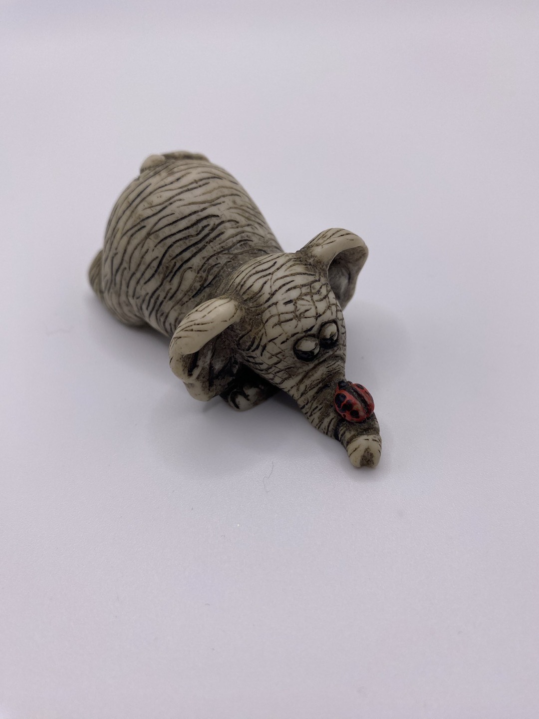Miniature Resin Elephant Figurine With Ladybug On Nose