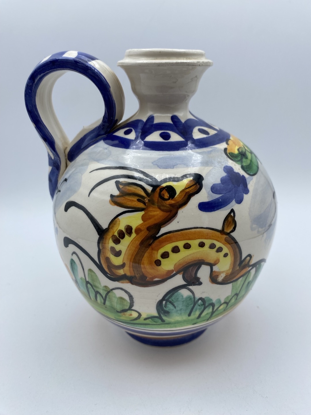 Vintage deer pottery jug