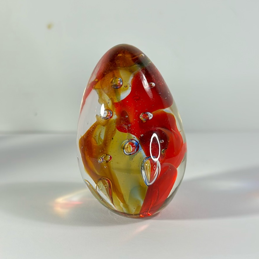 014. Small 3” x 2” Fiery Art Glass Egg Paperweight