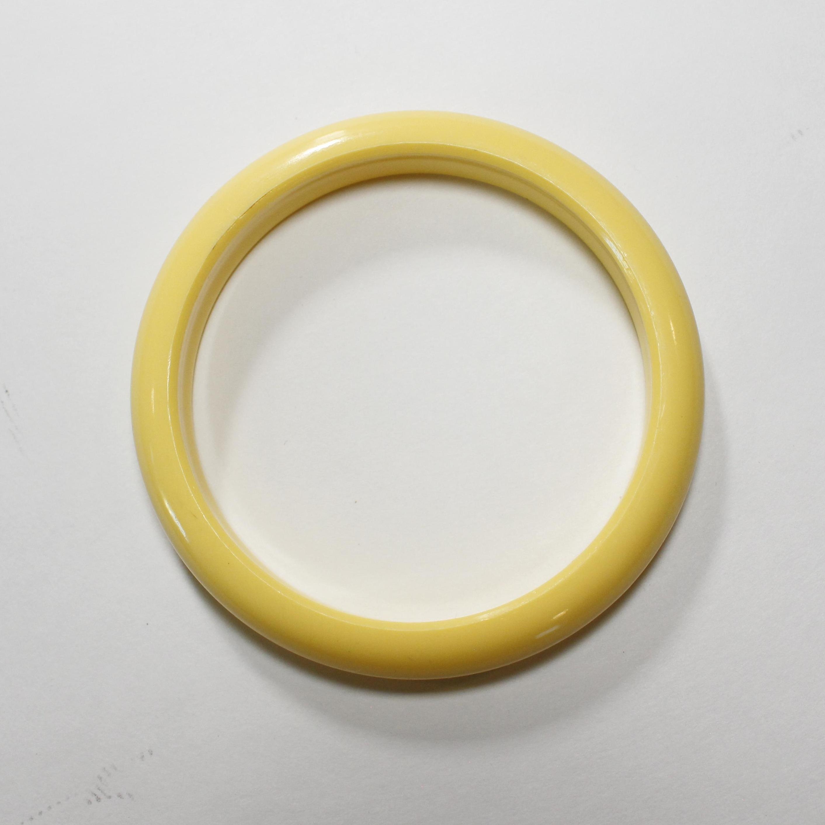 Solid Yellow Cream Celluloid? Plastic Bangle 2.625" opening