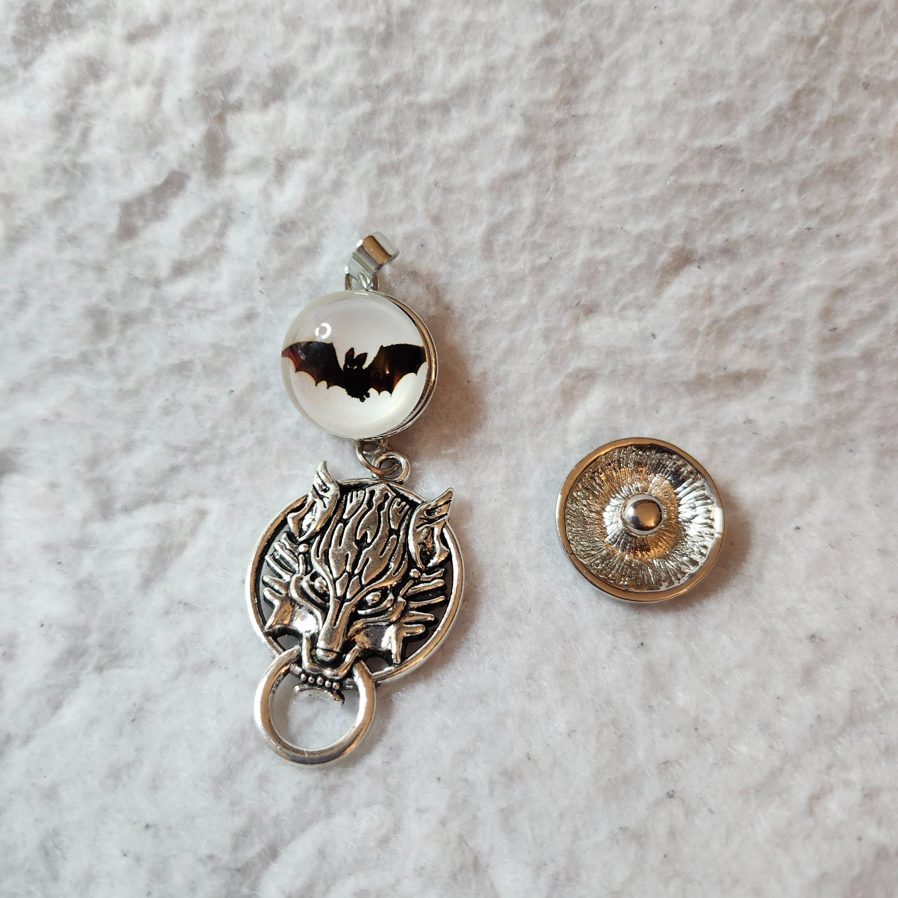 #19 Pendent with snap button that is changable. You pop out the middle ...