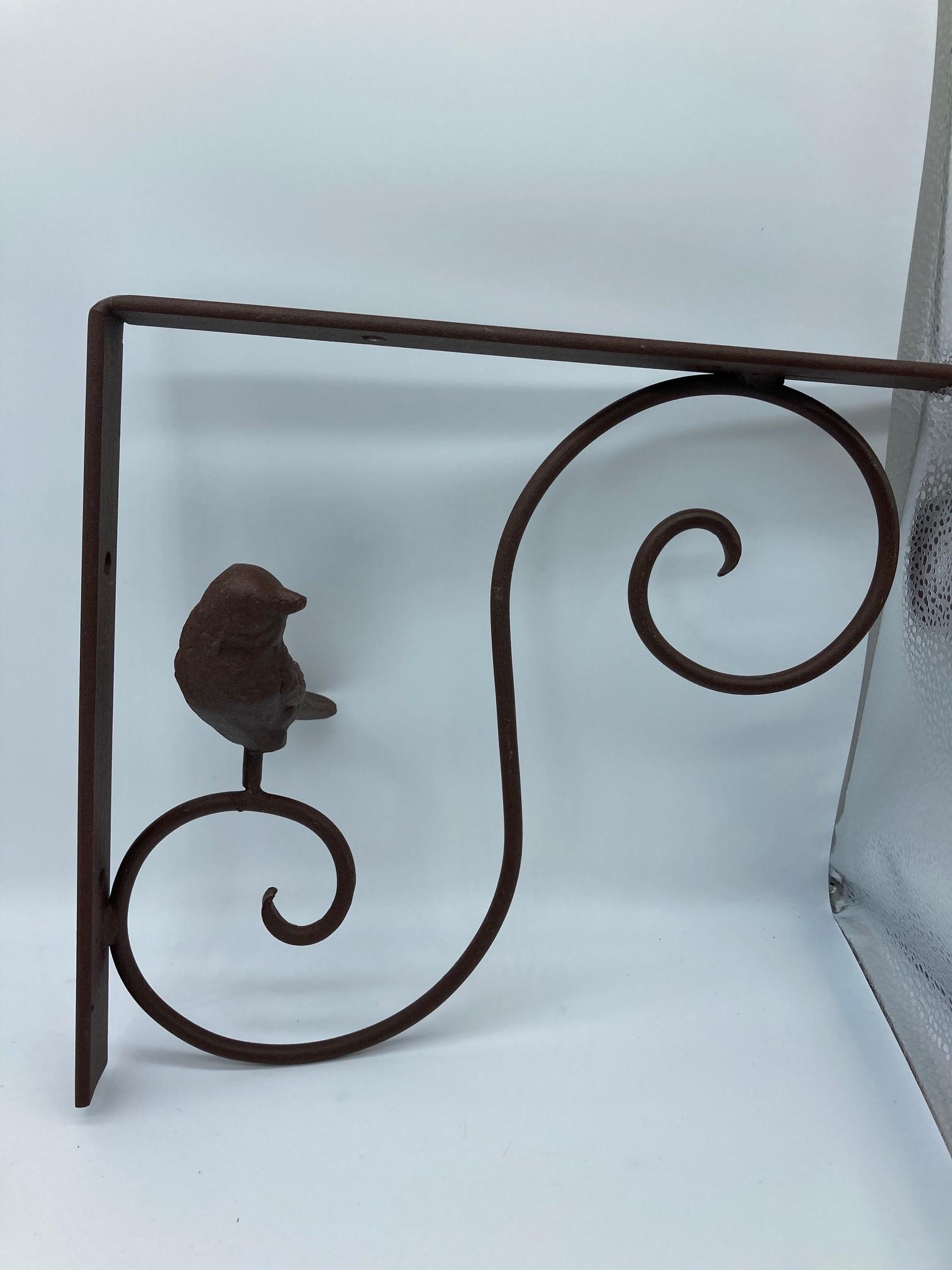 Iron bird shelf bracket