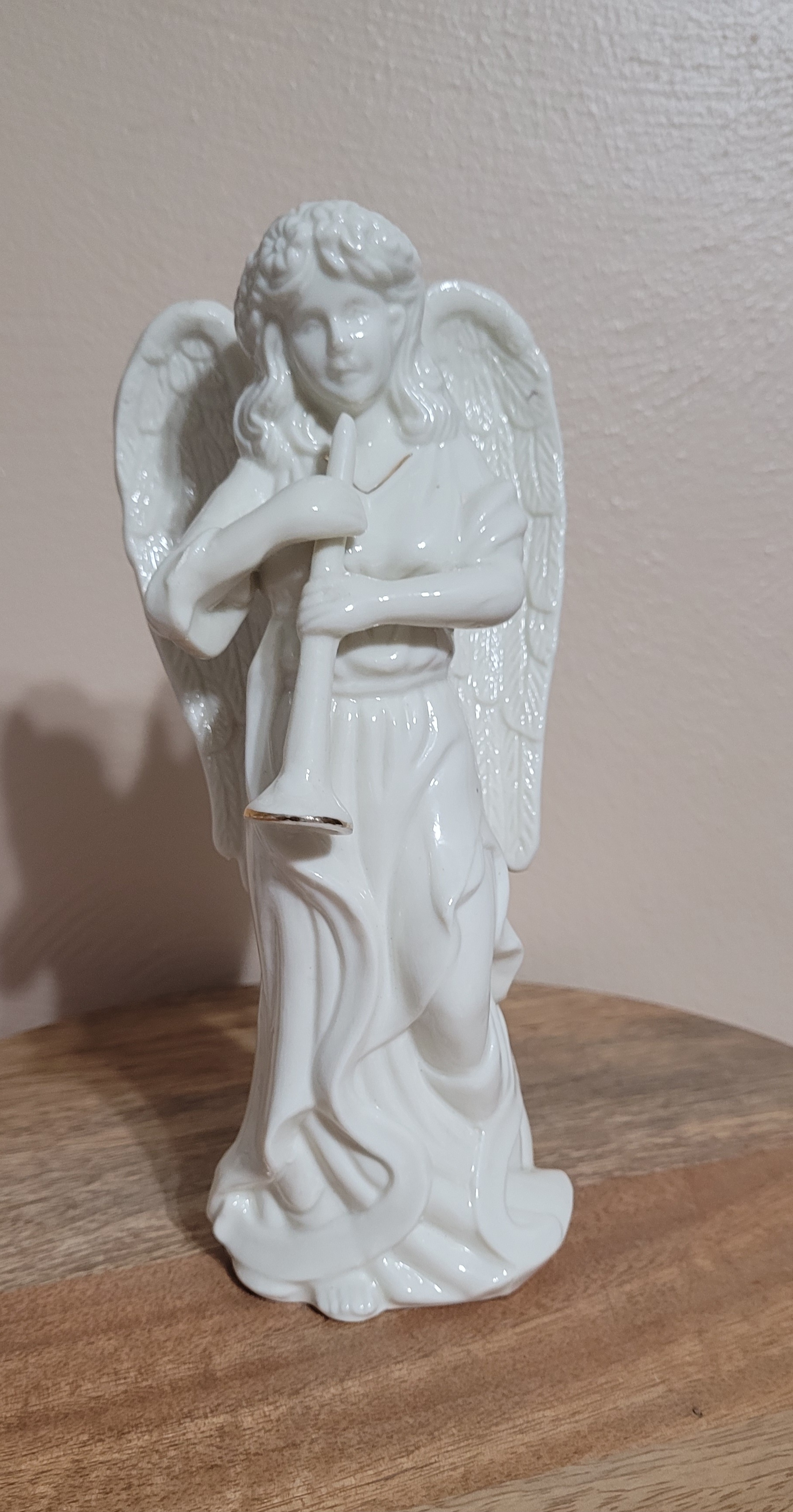 Porcelain Angel With Horn Gold Accents 8.5"