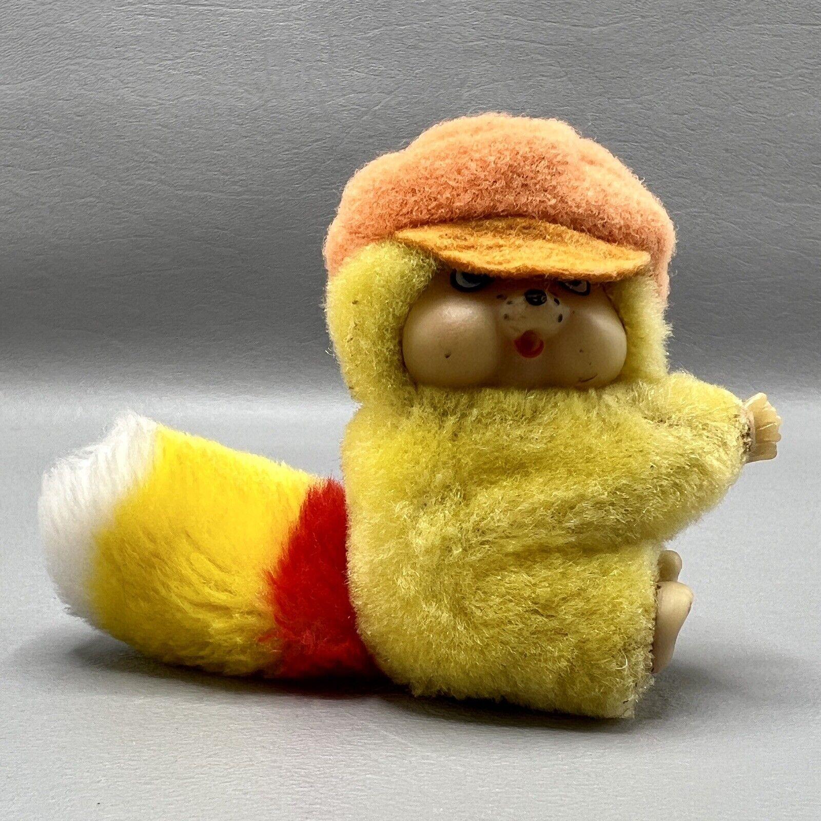 032 Vintage Monchichi Yellow Raccoon Clip On Rattle Tail Toy