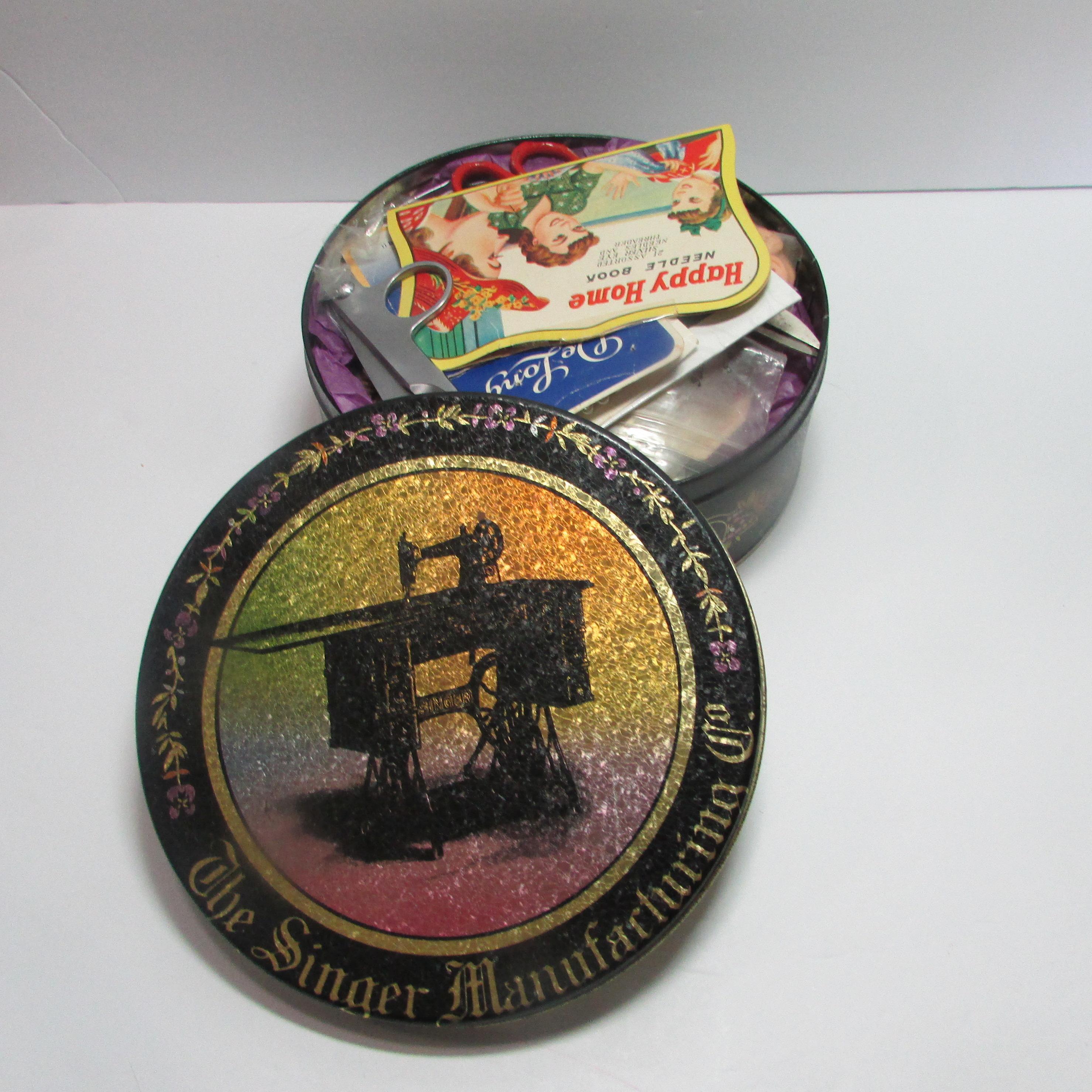vintage colorful singer sewing tin filled with sewing notions supplies