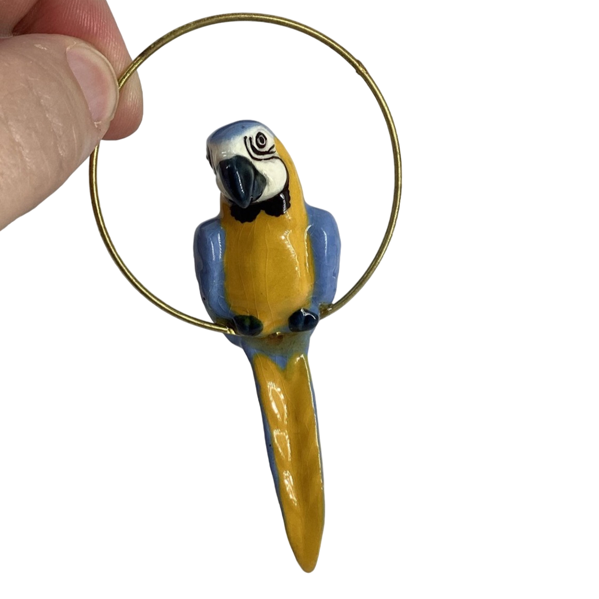 Retired Hagen Renaker Blue and Yellow Parrot Bird on Metal Hoop