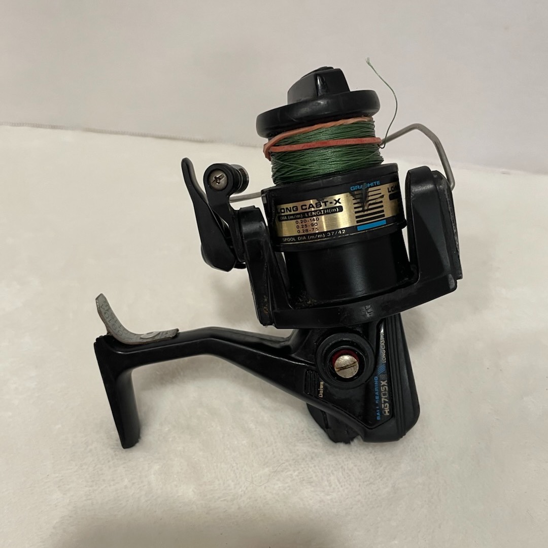 Vintage Daiwa Graphite Long Cast-X Spinning Reel AG705XB Black Smooth Cast