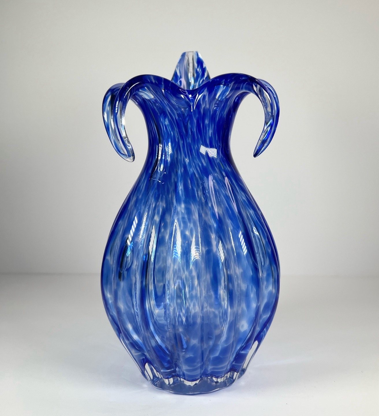 Hand Blown Blue Mottled Art Glass Vase With Pulled Down Petals Ribbed