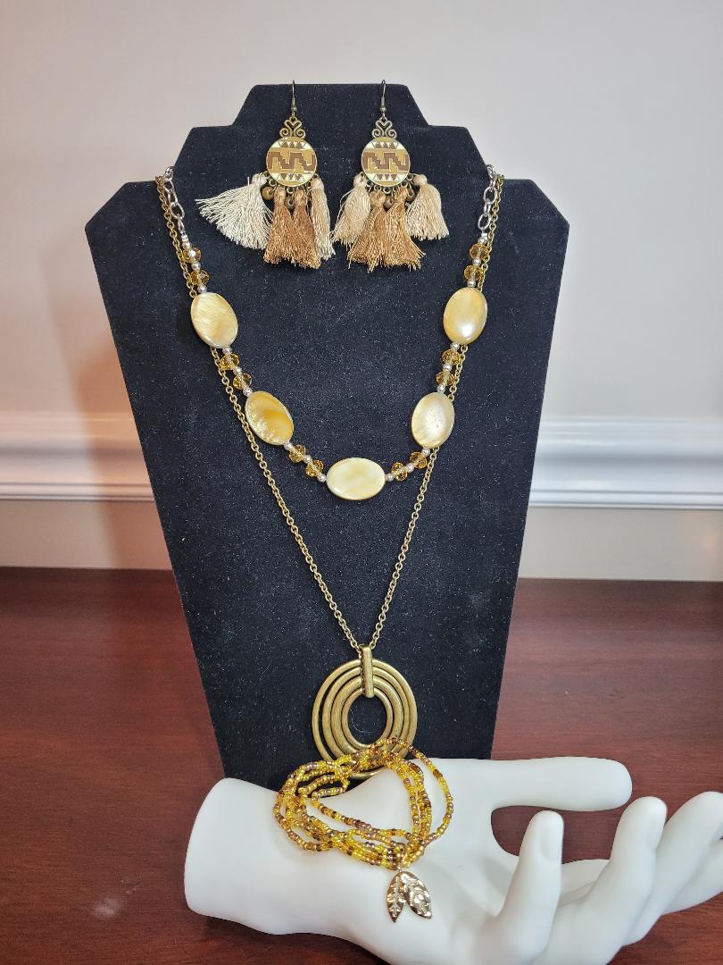 Costume Gold and brown lot Jewelry, one marked LC