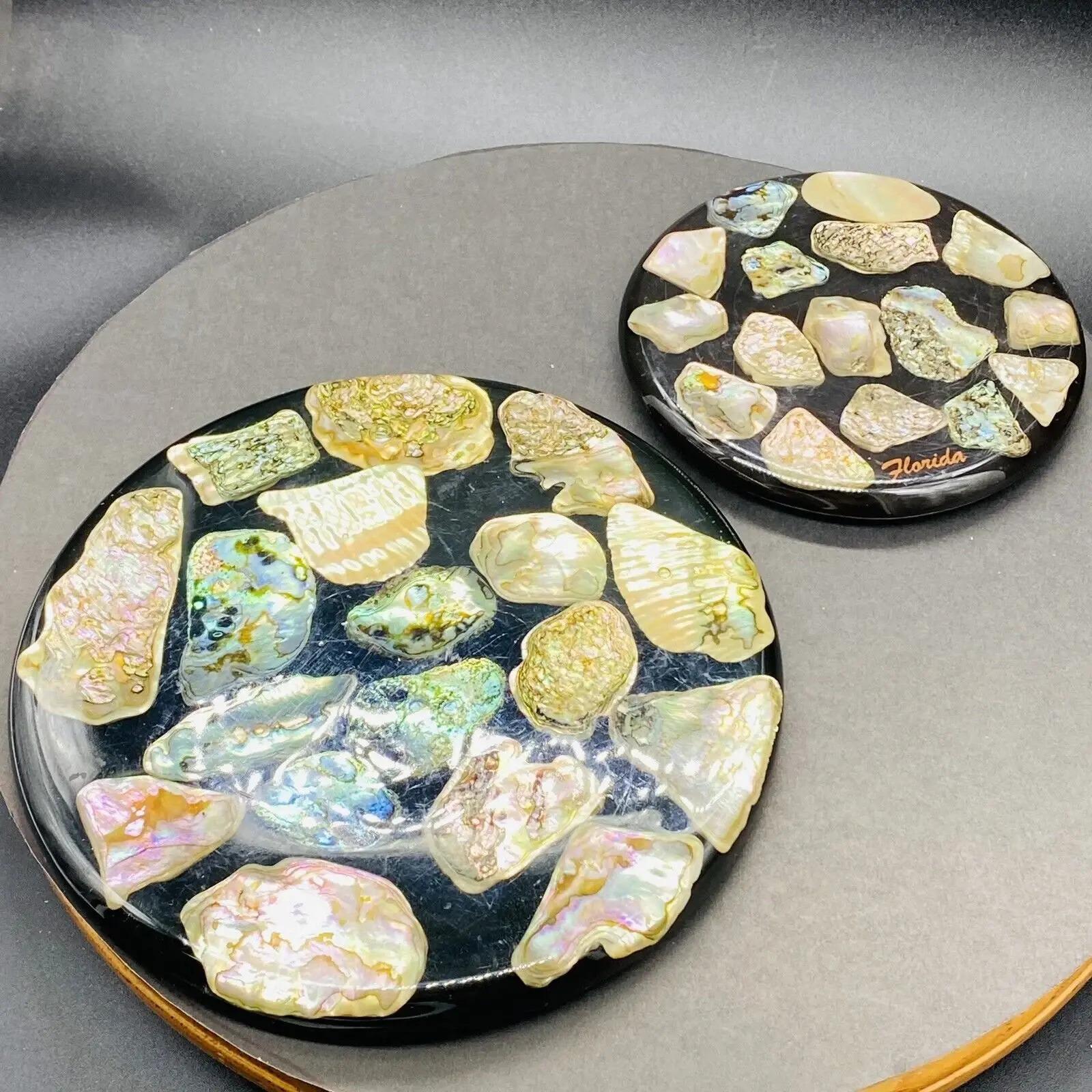 Trivet Abalone Black resin lucite shell set of large/small pair 1970s