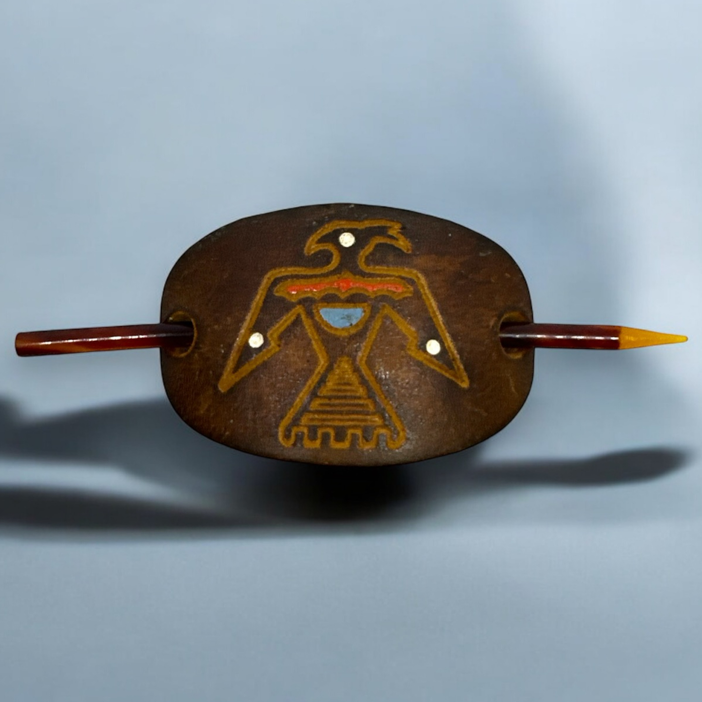 014. Vintage Embossed Leather Thunderbird Ponytail Bun Holder Chopstick