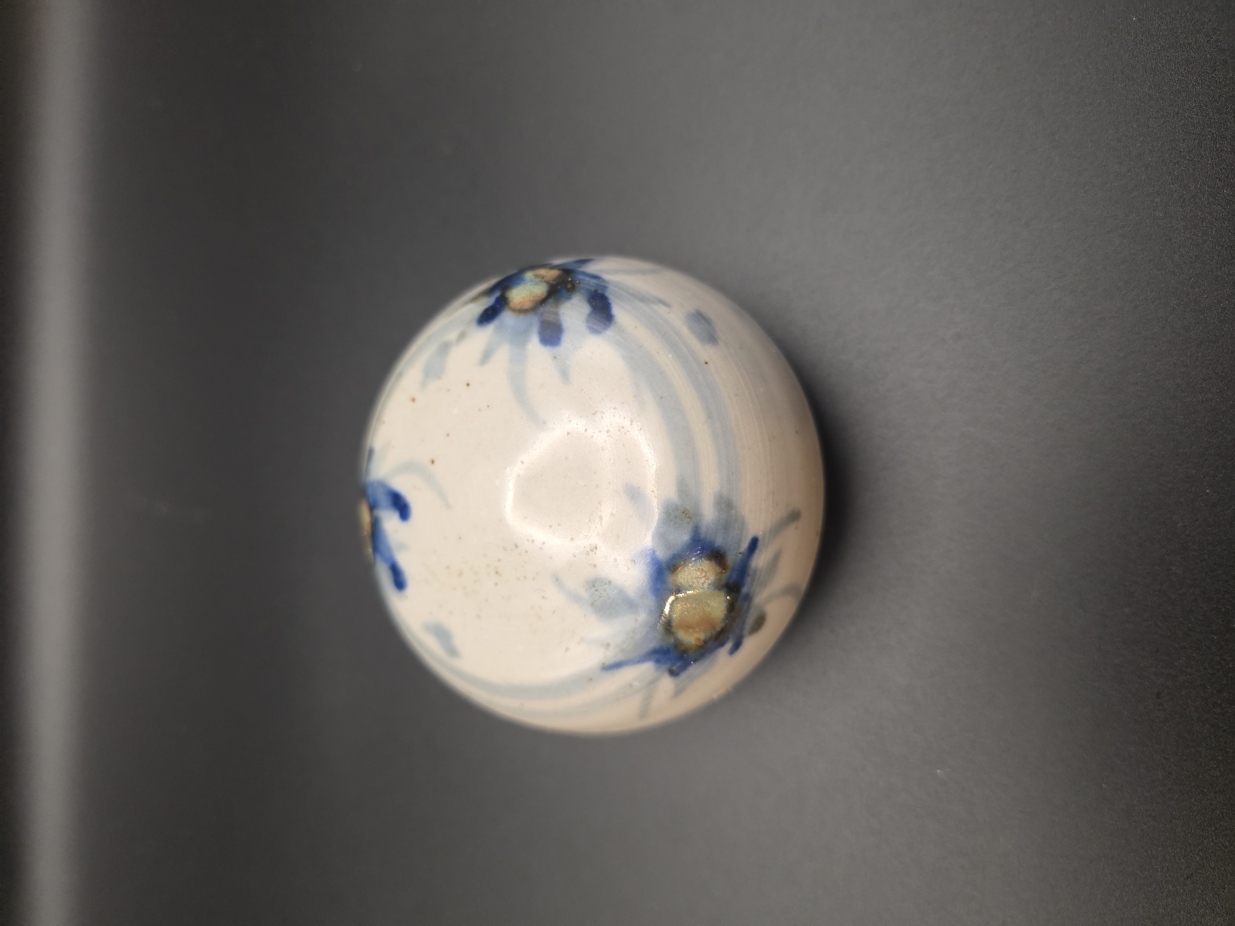 Pottery paperweight signed