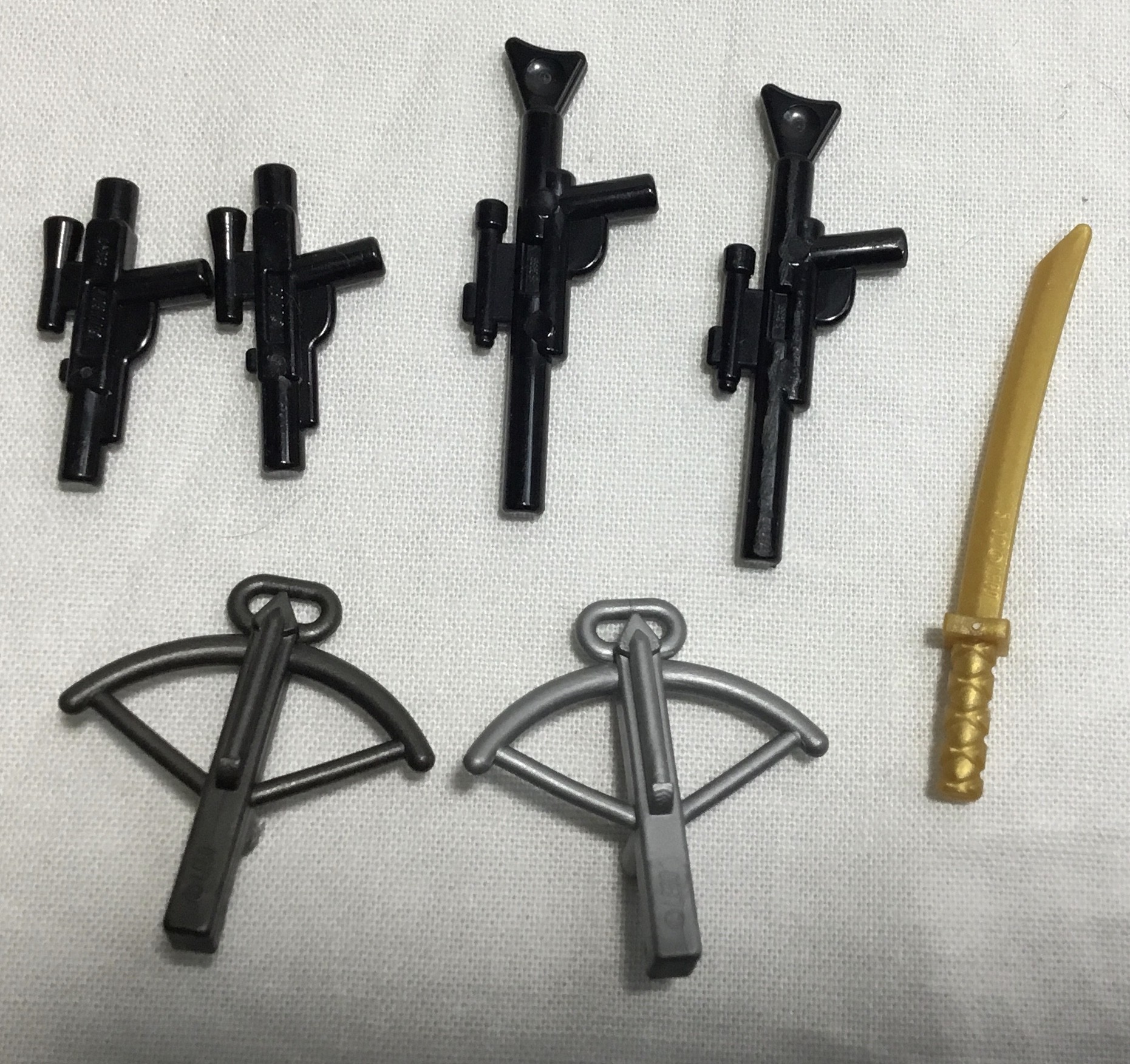 Lego minifig weapons, lot of 7, sword, crossbows, Possible misprint ...