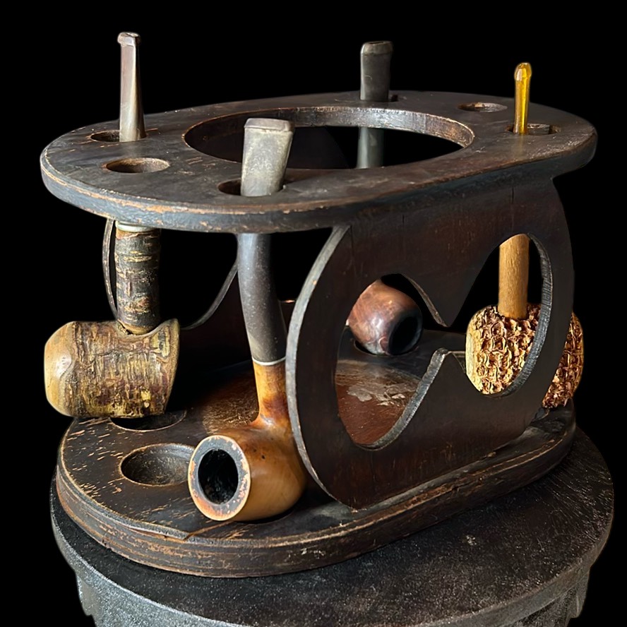 Old Pipe Stand With Four Pipes