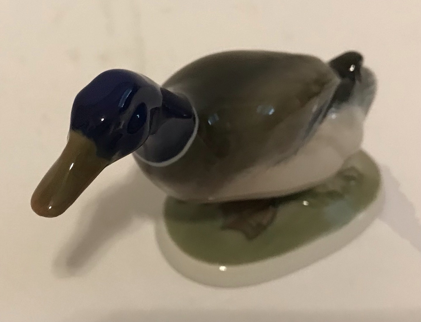 Two Vintage collectible miniature duck figurines