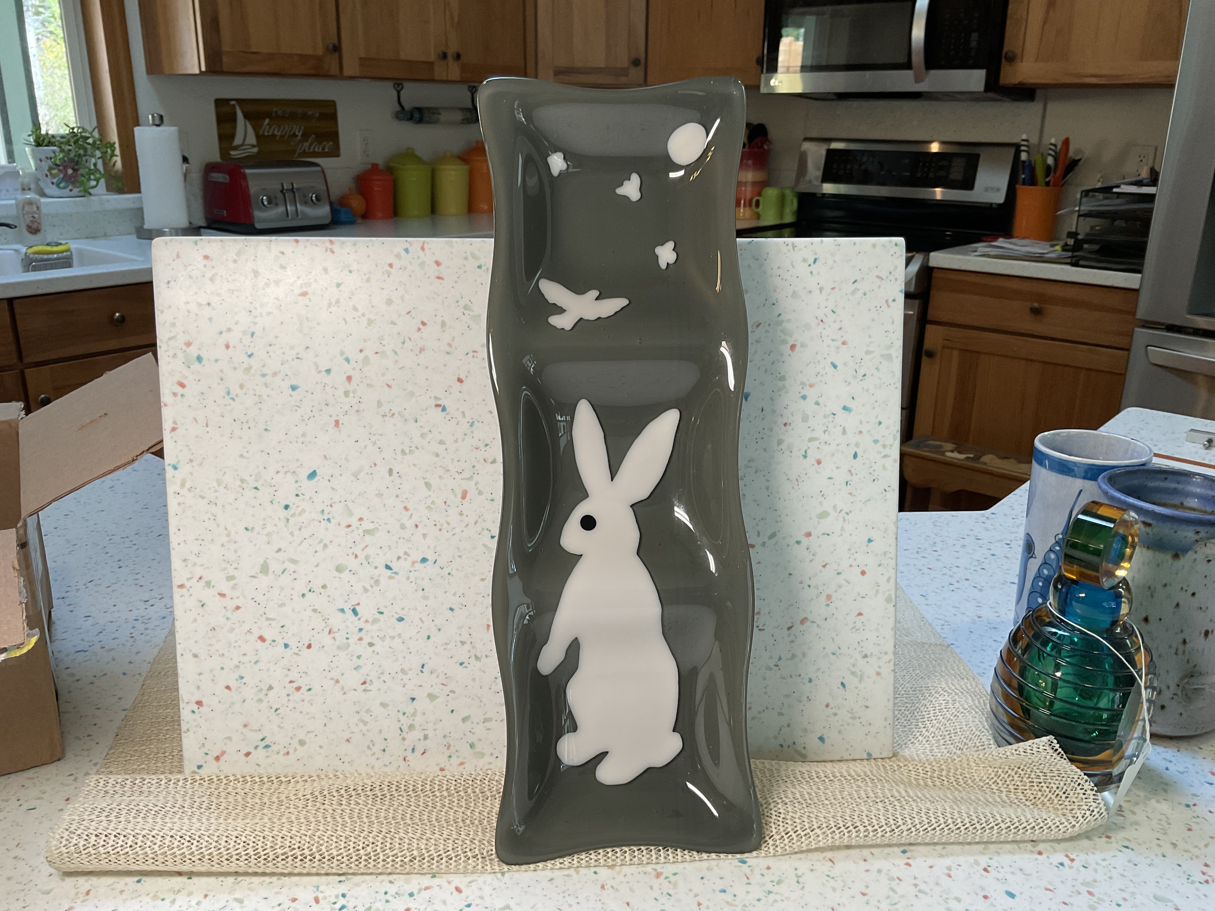 Fused glass white rabbit, birds, and sun on three compartment grey ...