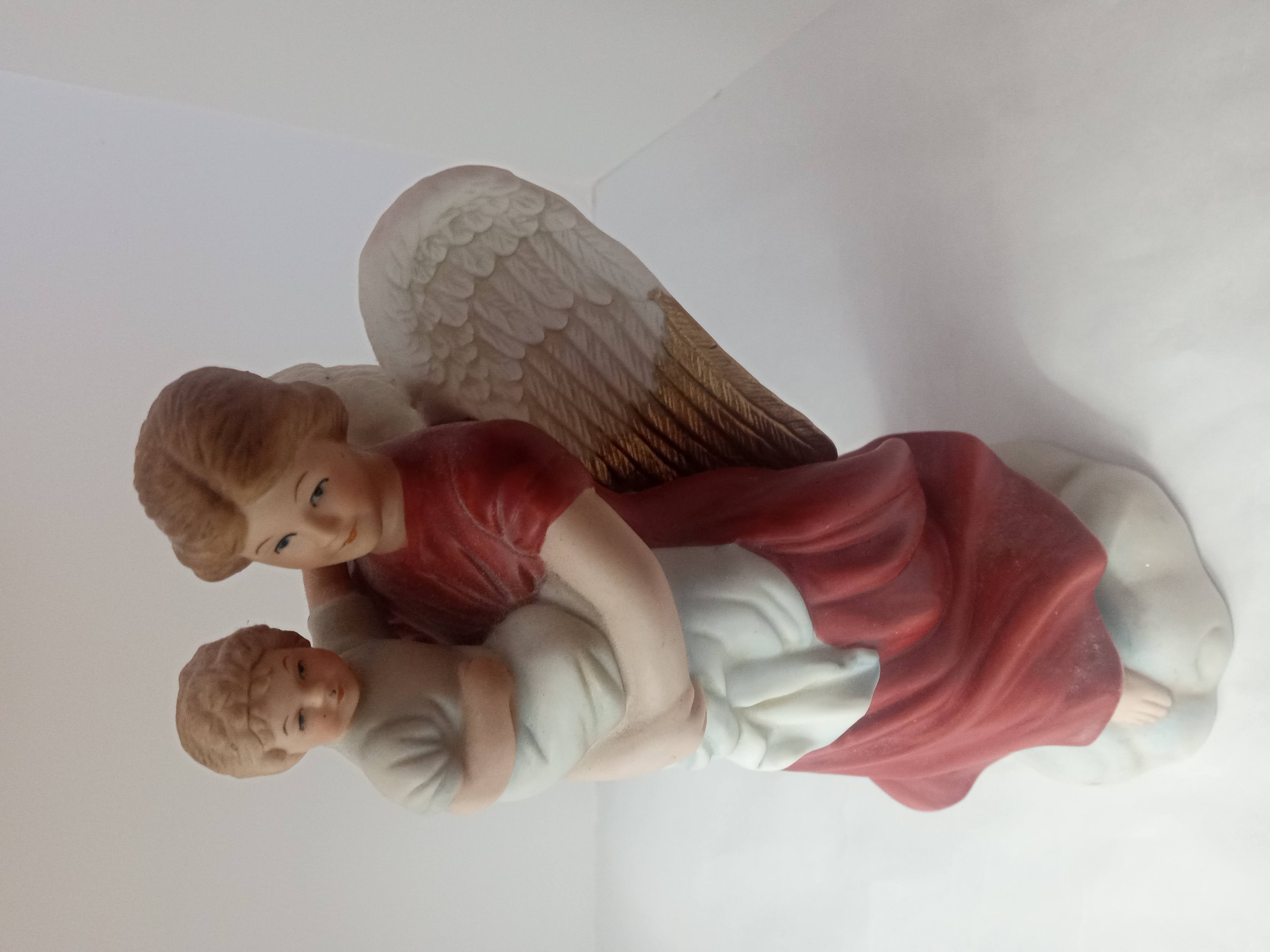 #05 porcelain Angel and child figurine