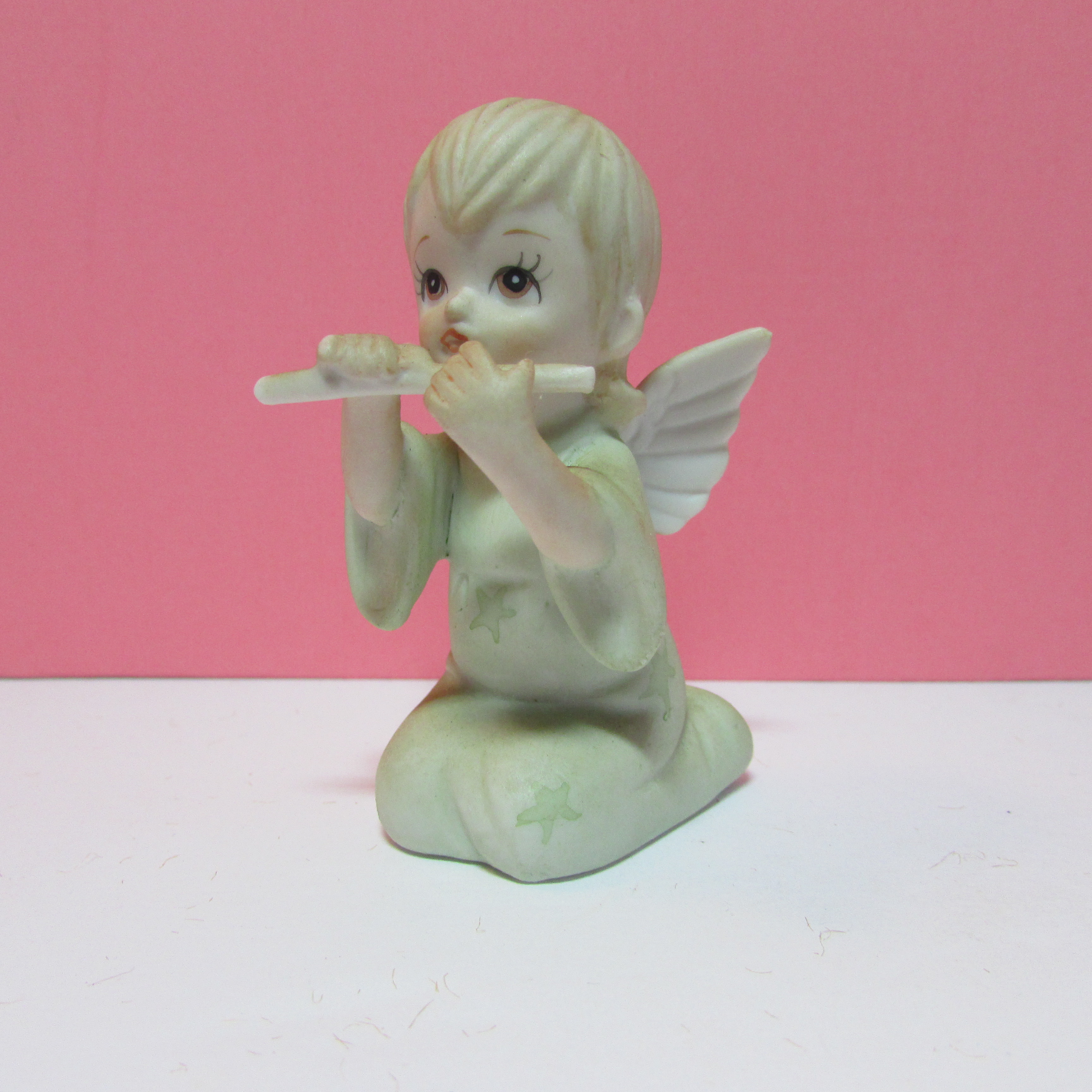 vintage Lefton kneeling angel playing flute figure