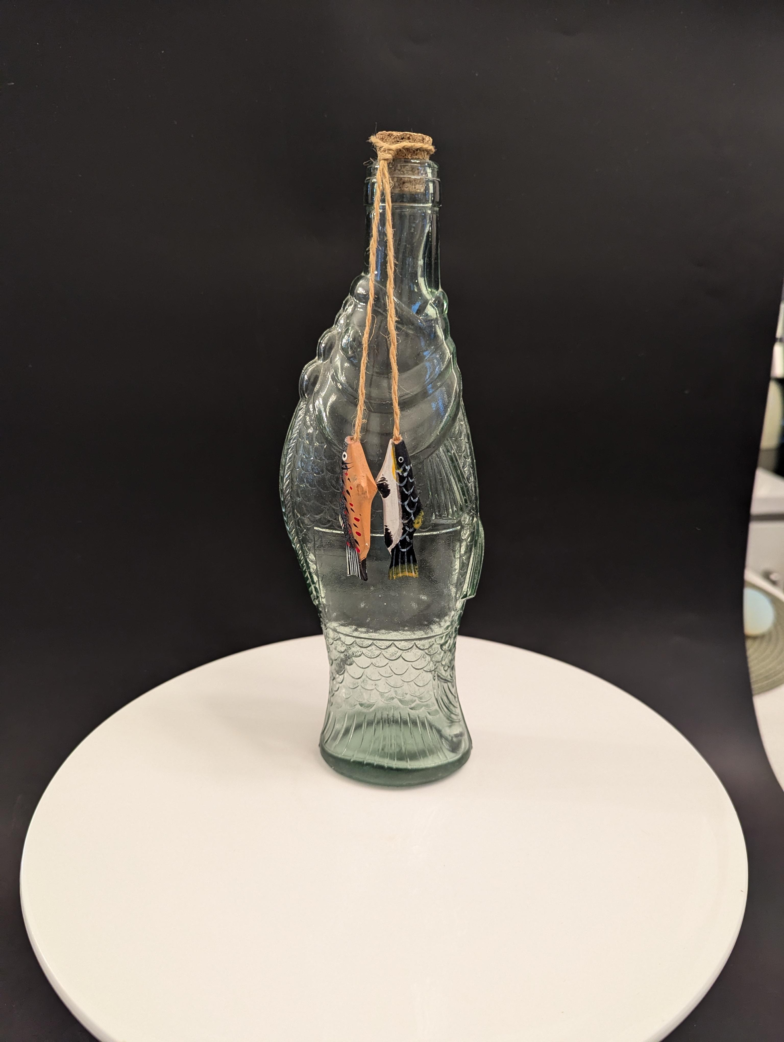 Vintage Fish-Shaped Glass Bottle with Fishing Lure Decor