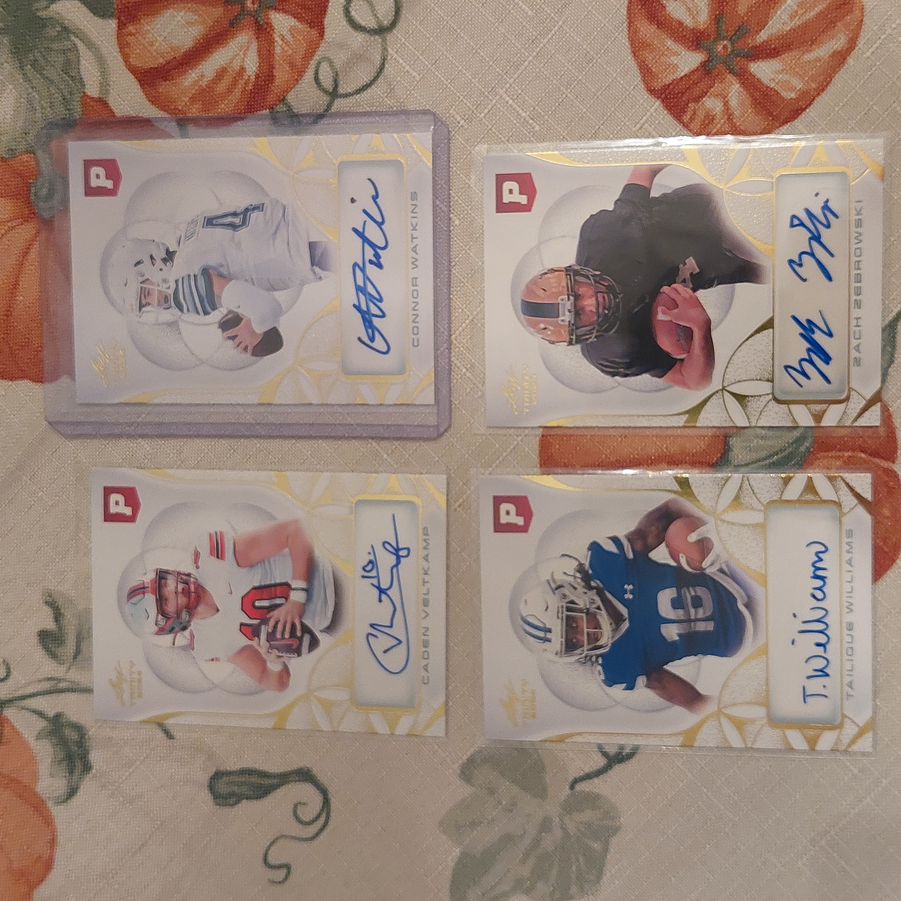 Lot of 36 College football cards. 4 auto's, 1 #'d +. Letters U V W Y Z.