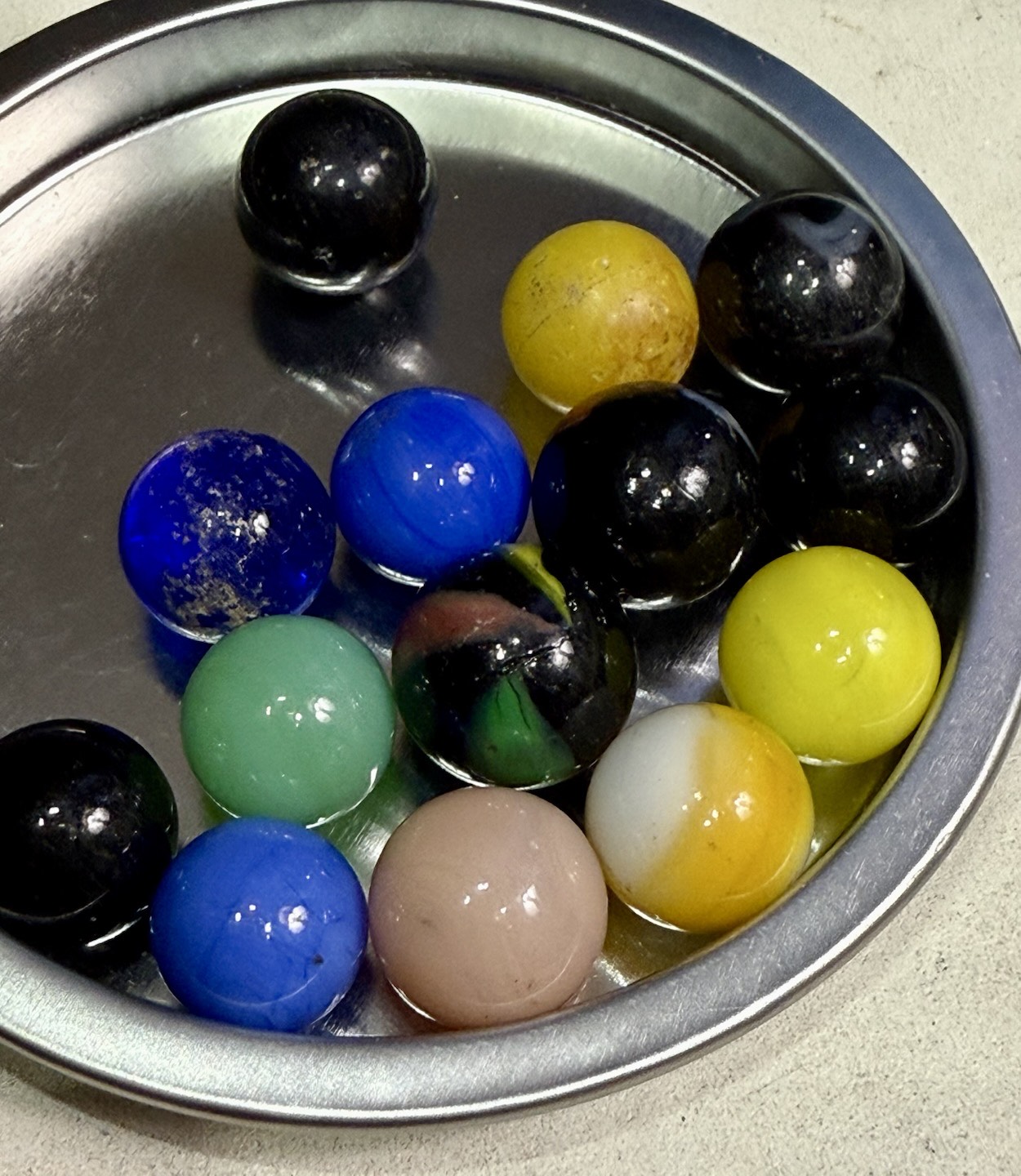 Variety Of Color And Sizes Of Marbles Including One That Glows With UV ...