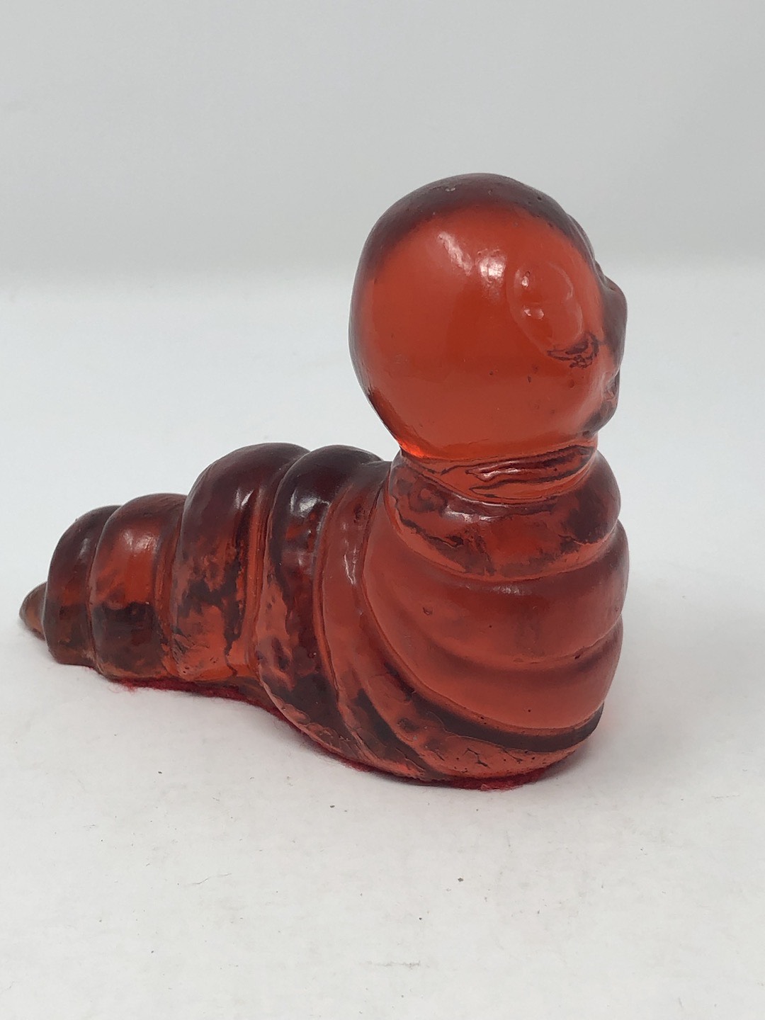 Red Lucite Inchworm Figurine