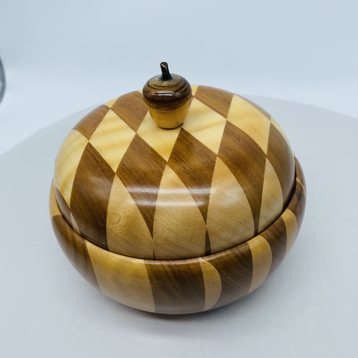 Signed wood turned harlequin box with lid 6 inch wide Signed Acorn Finial