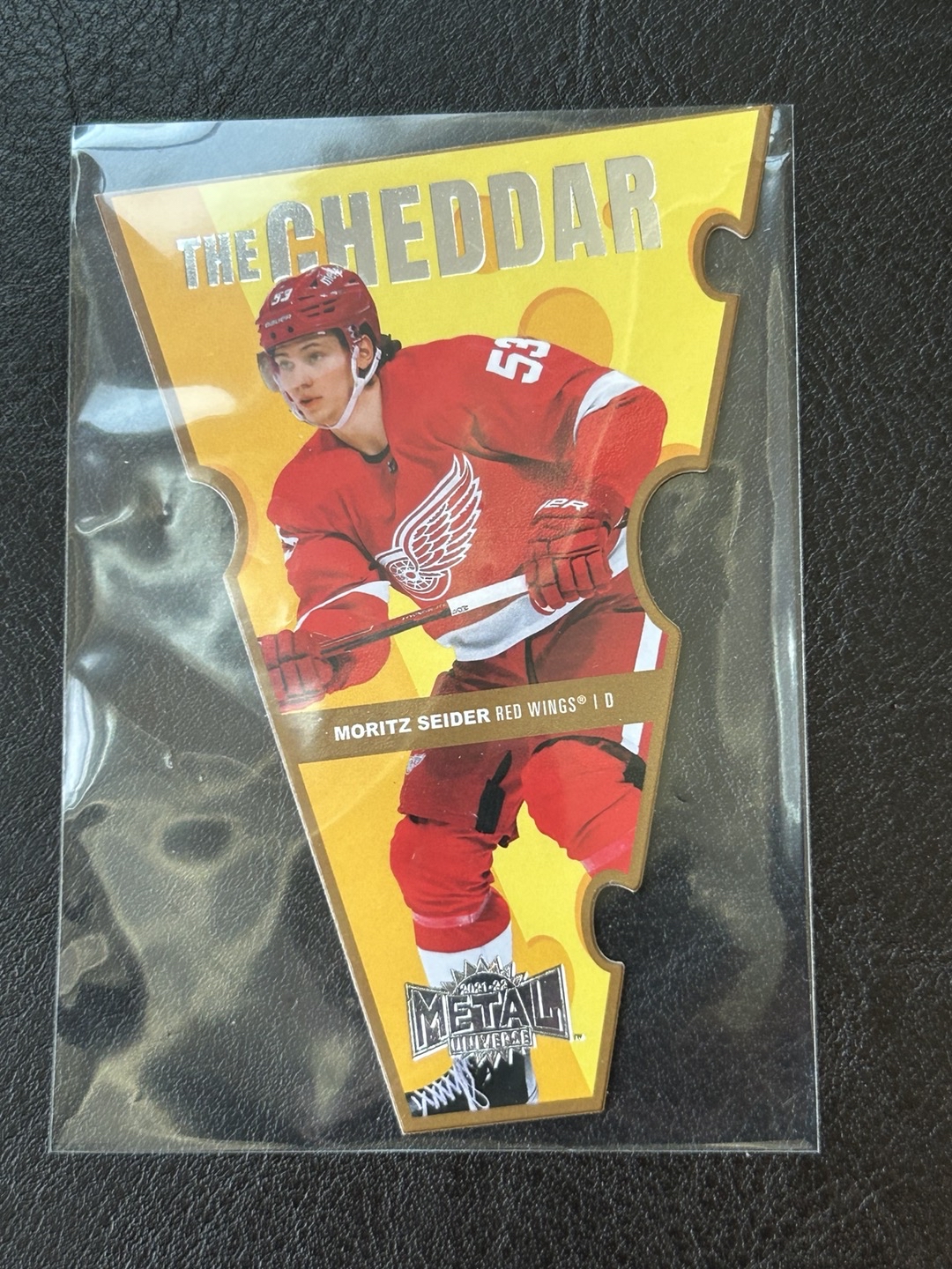 2021-22 Skybox Metal The Cheddar Moritz Seider Rookie